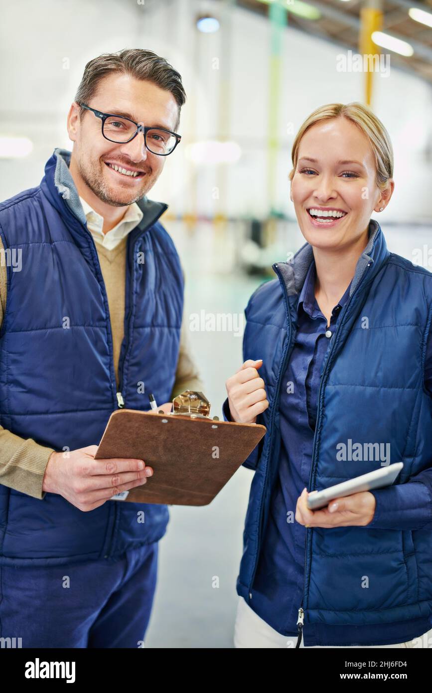 He still likes working the paper. Portrait of two people working in a ...