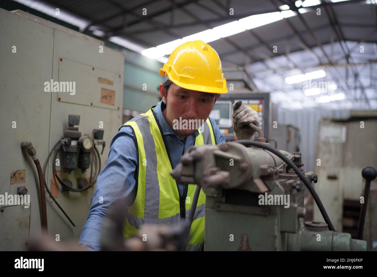 Male engineer metalworker industrial experienced operator technician ...