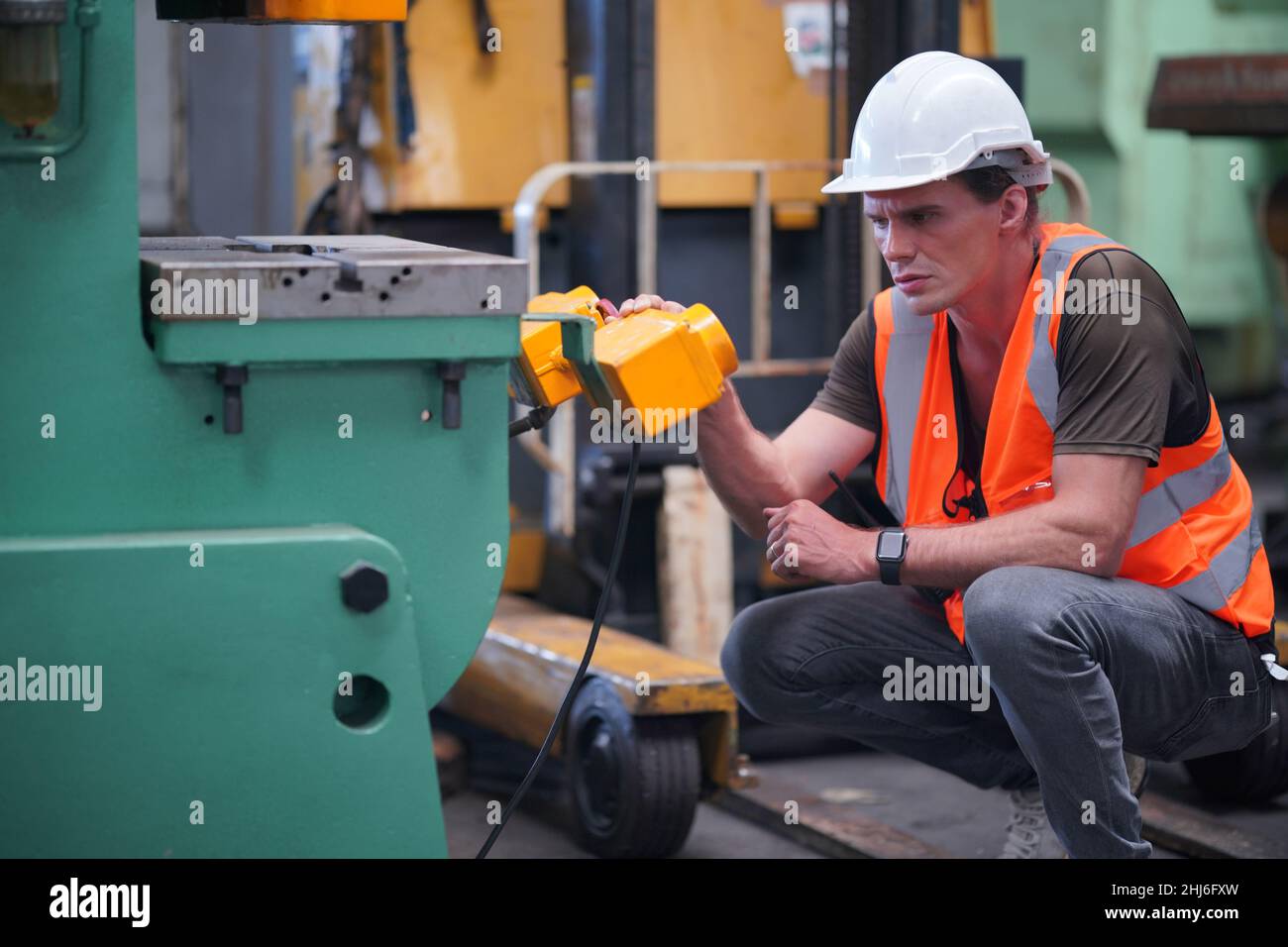 Production worker helmet hi-res stock photography and images - Alamy