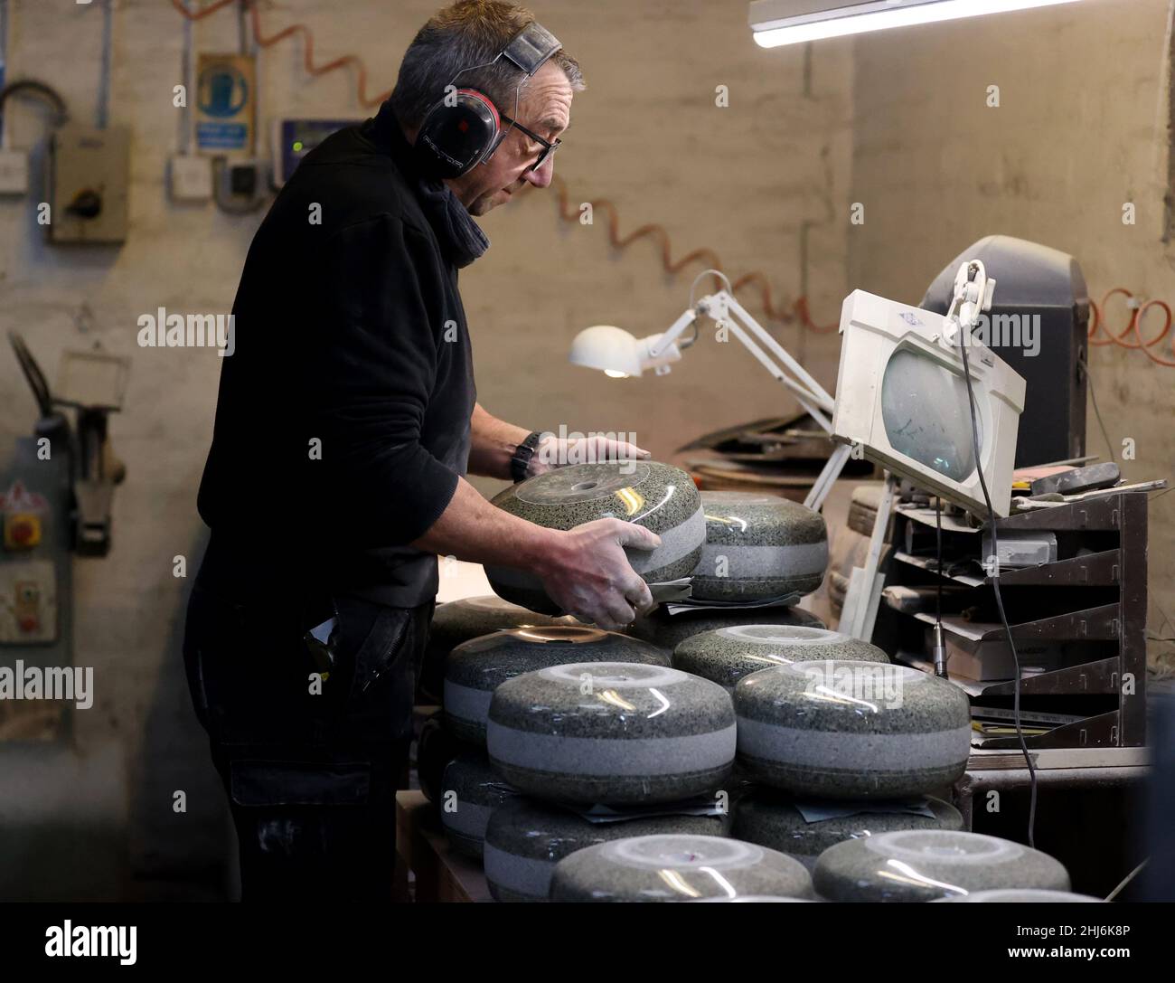 Mauchline, Britain. 24th Jan, 2022. A man works in Kays Curling factory ...