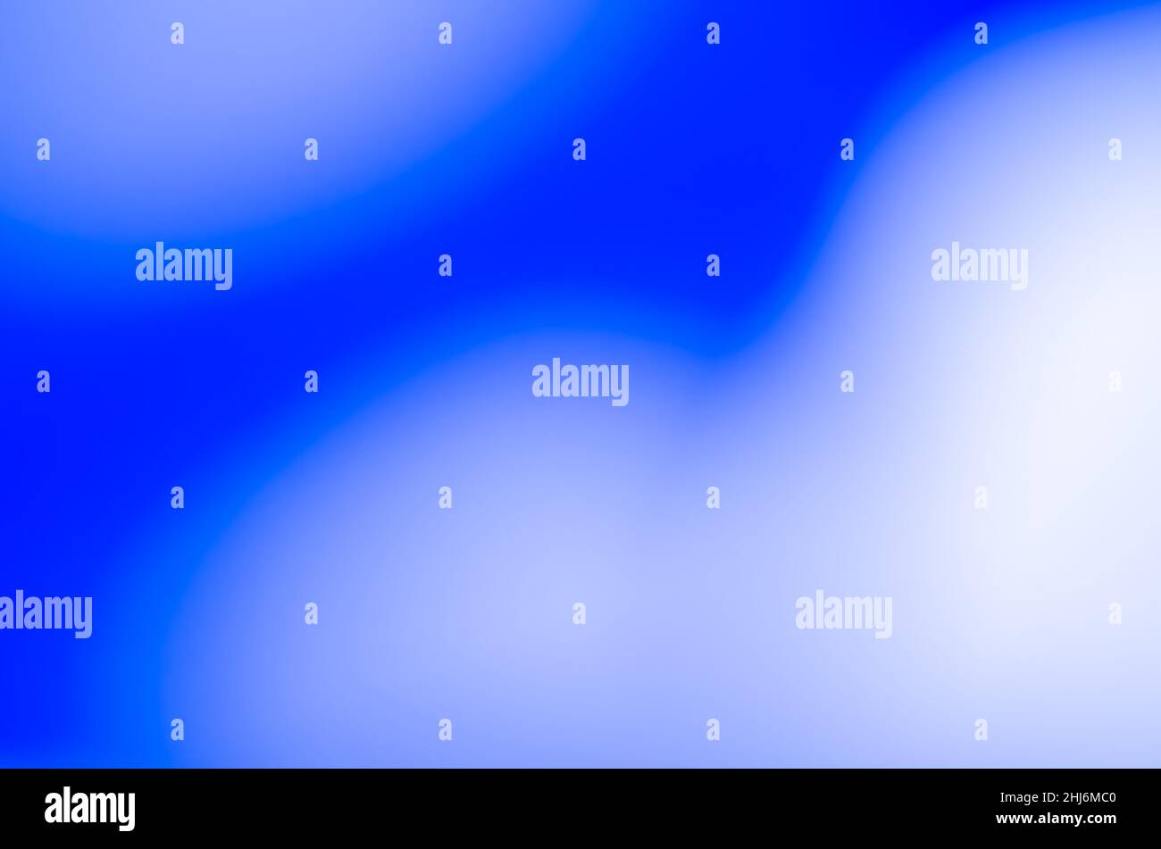 Abstract background with blurry blobs of colour and light with copy ...