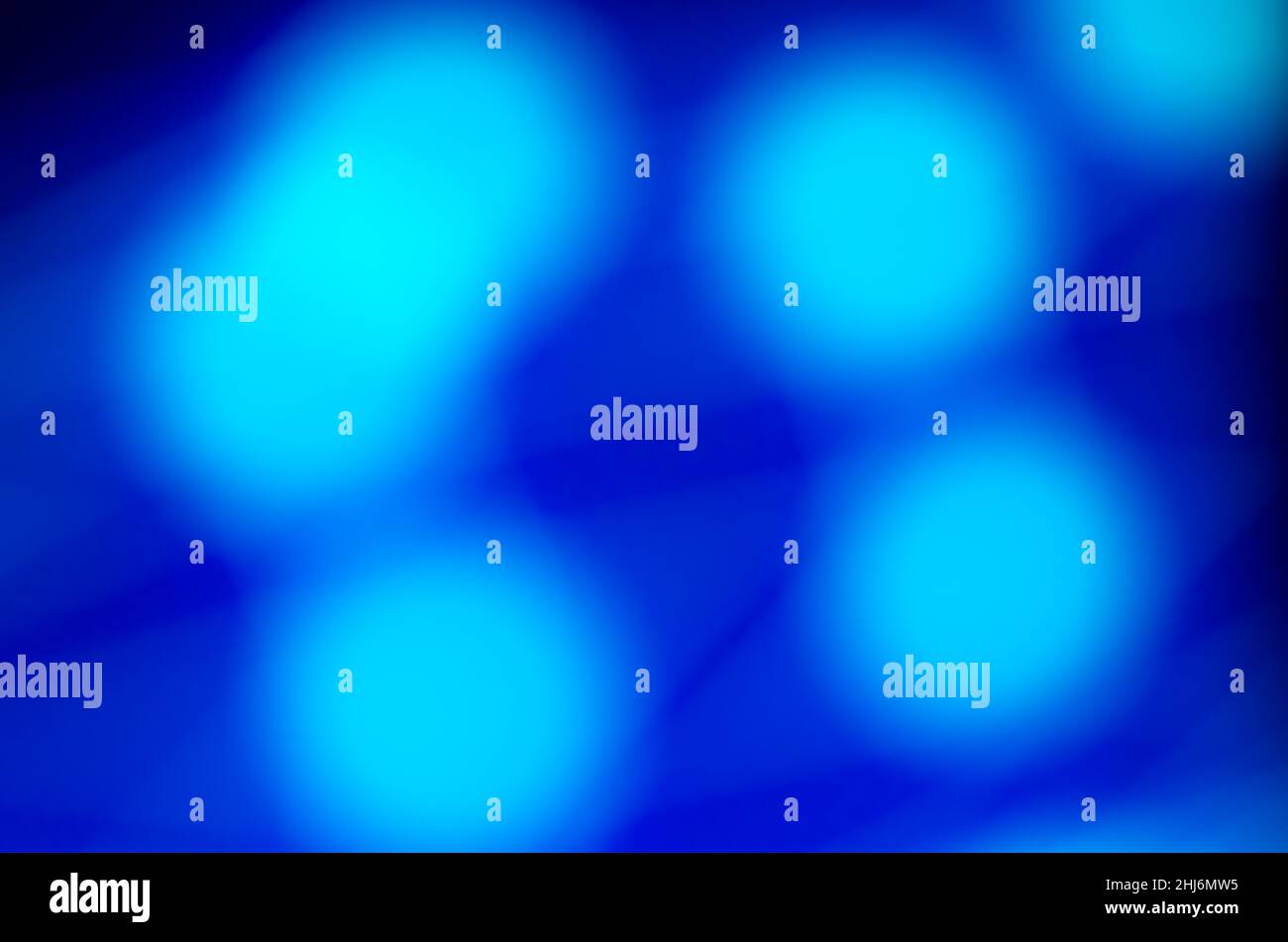 Abstract Background With Blurry Blobs Of Blue Colour And Light With