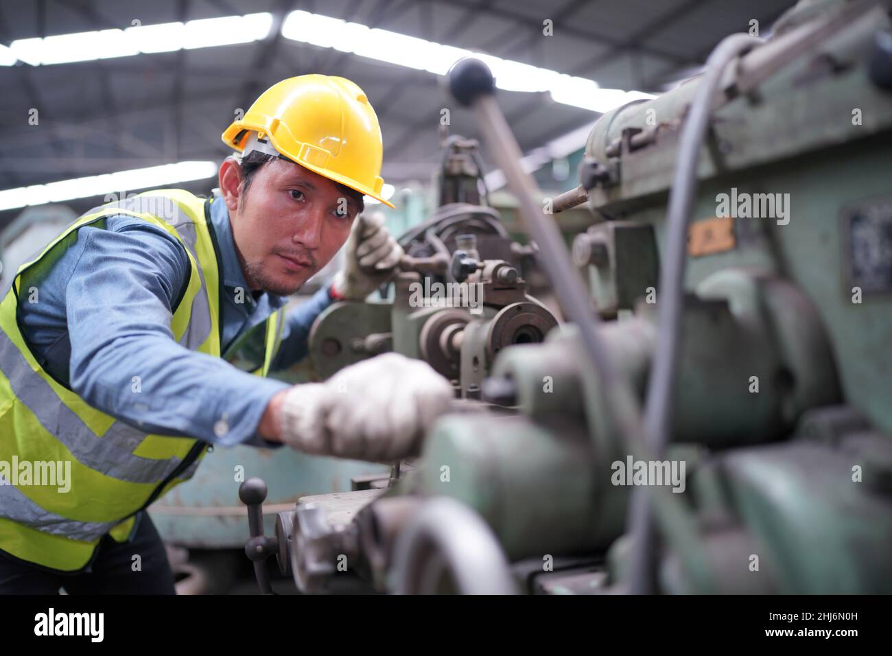 Male engineer metalworker industrial experienced operator technician ...