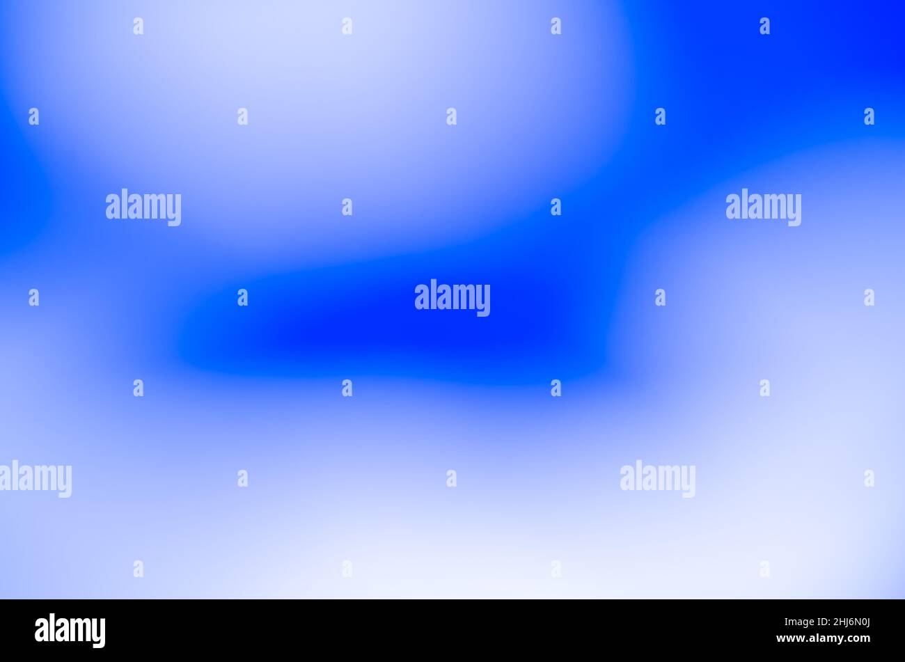 Abstract background with blurry blobs of colour and light with copy ...