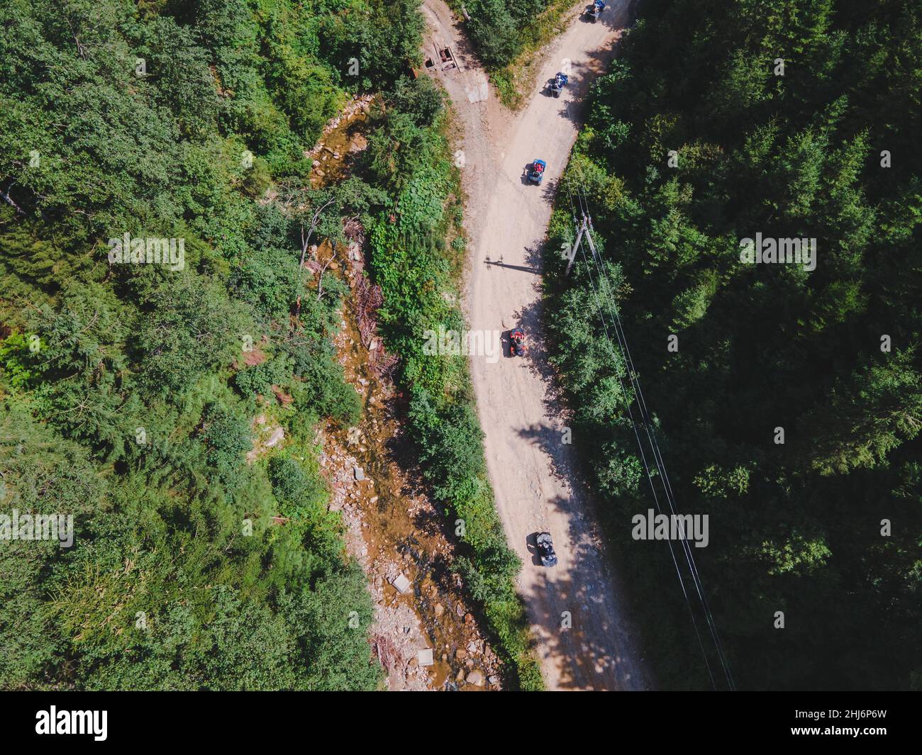 aerial view of quad bike riders at mountain trail road copy space Stock ...