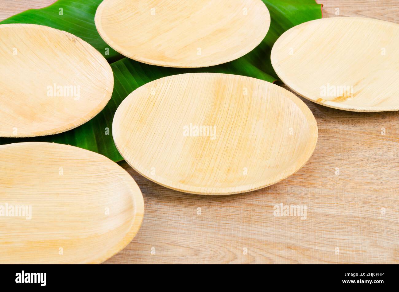 Kitchenware made from dried betel nut leaf palm, natural material. The ...