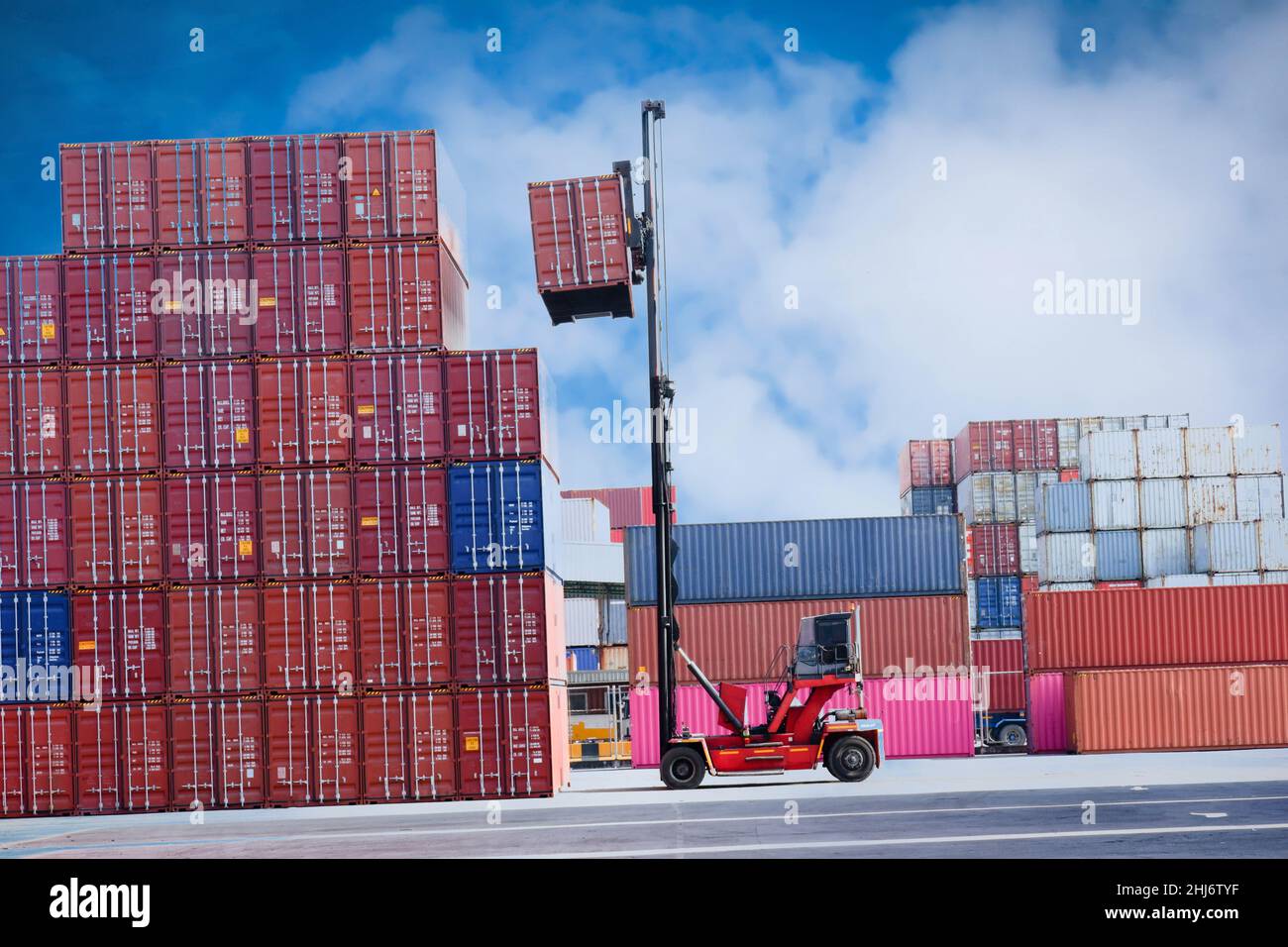 container forklift in the container yard Stock Photo - Alamy