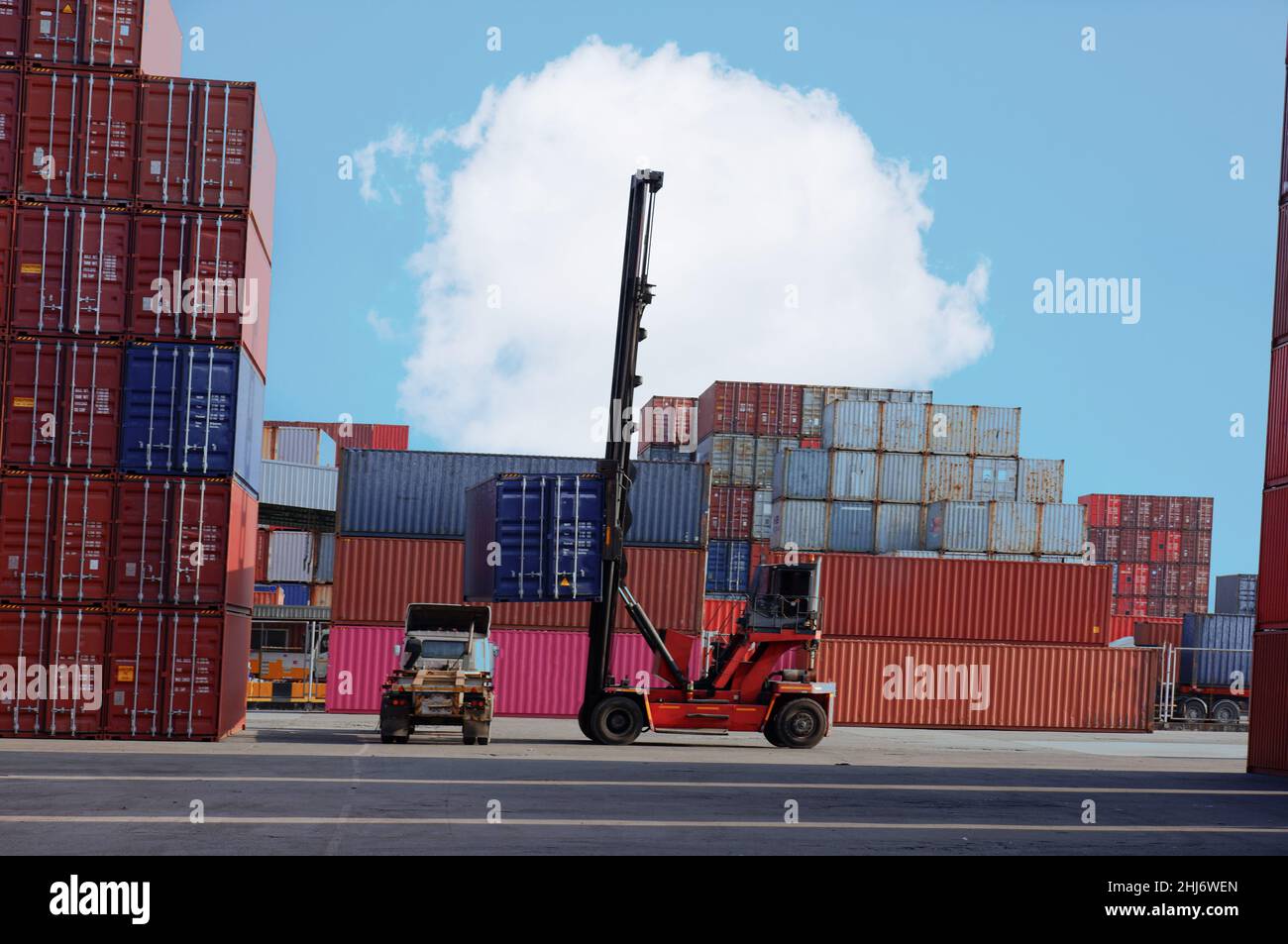 container forklift in the container yard Stock Photo - Alamy