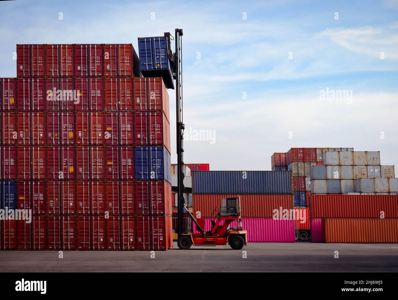 container forklift in the container yard Stock Photo - Alamy