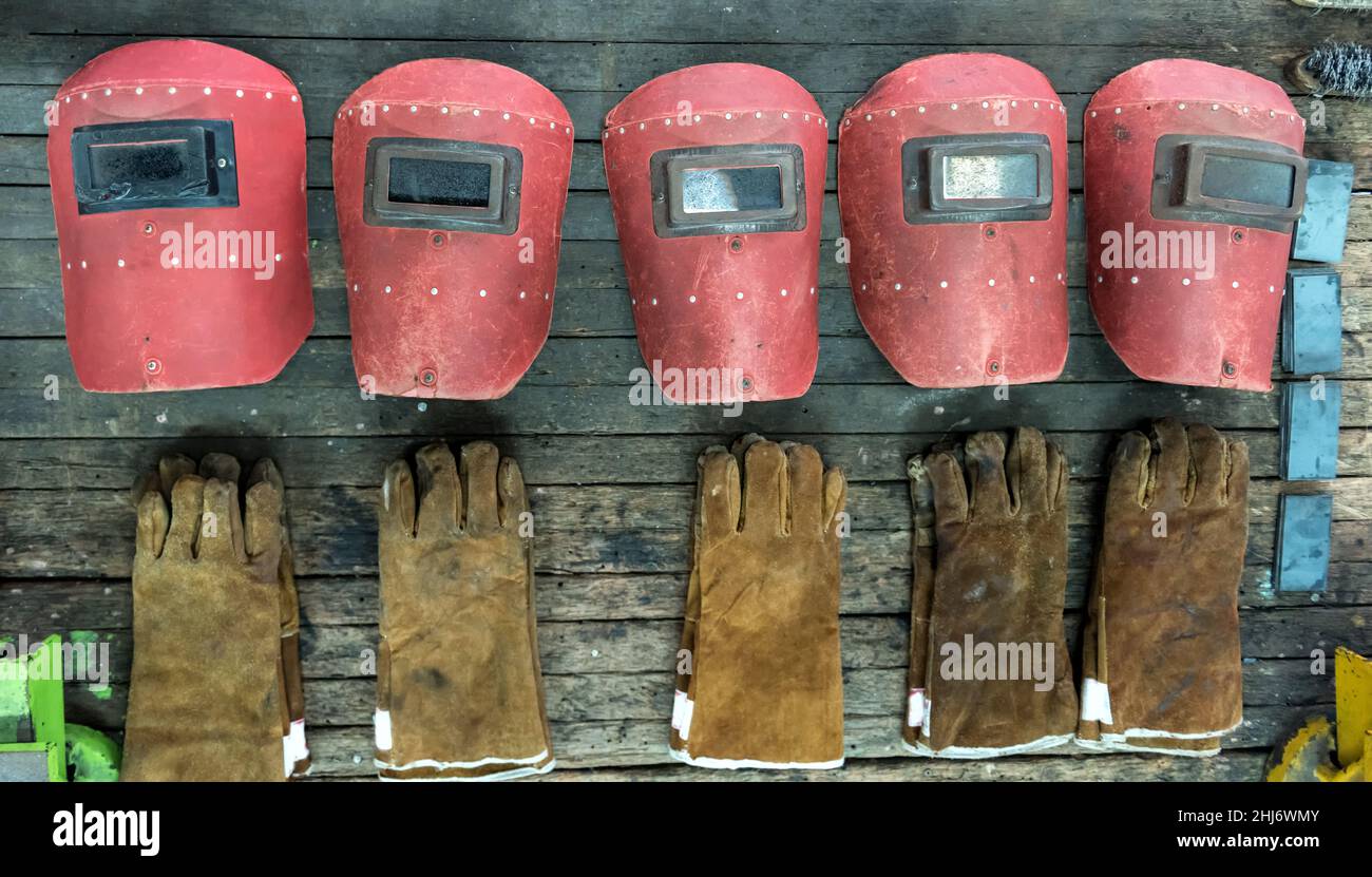 Welding safety mask in workshop factory Stock Photo - Alamy