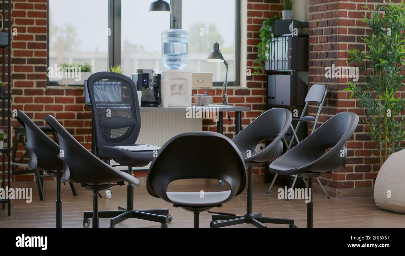 Empty room designed with chairs in circle for aa group therapy session ...