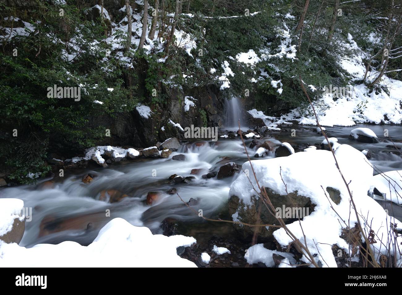 long exposure nature photo of snow and river of palovit waterfall local ...