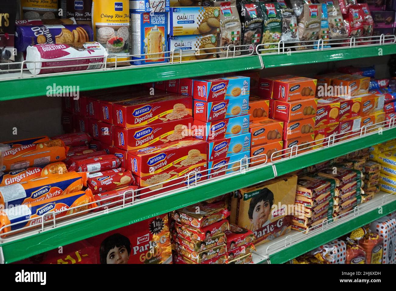 Supermarket aisle of Biscuits, Snacks, Cookies. Various brand biscuits ...