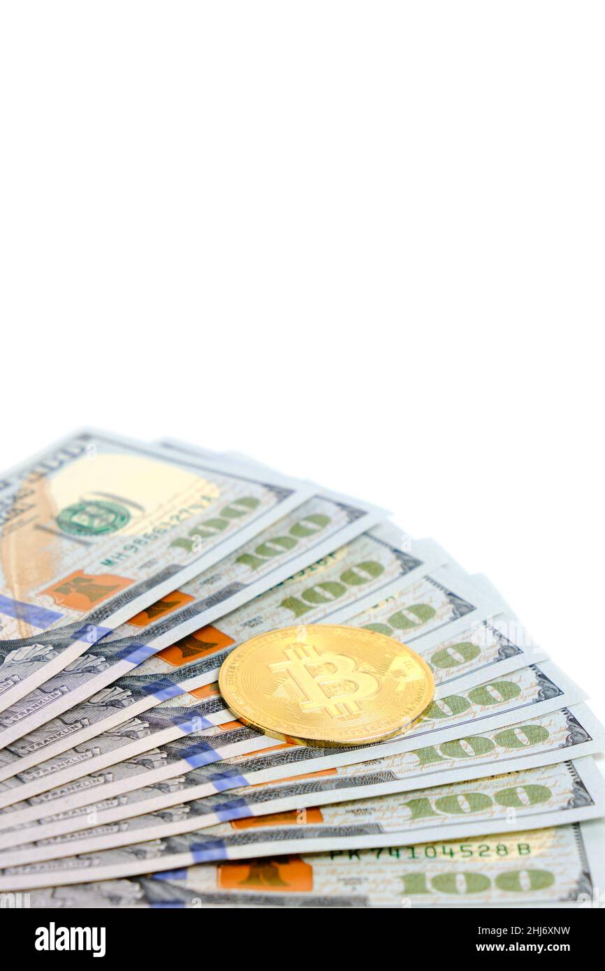 An unfolded bundle hundred dollar bills and one bitcoin coin on white ...