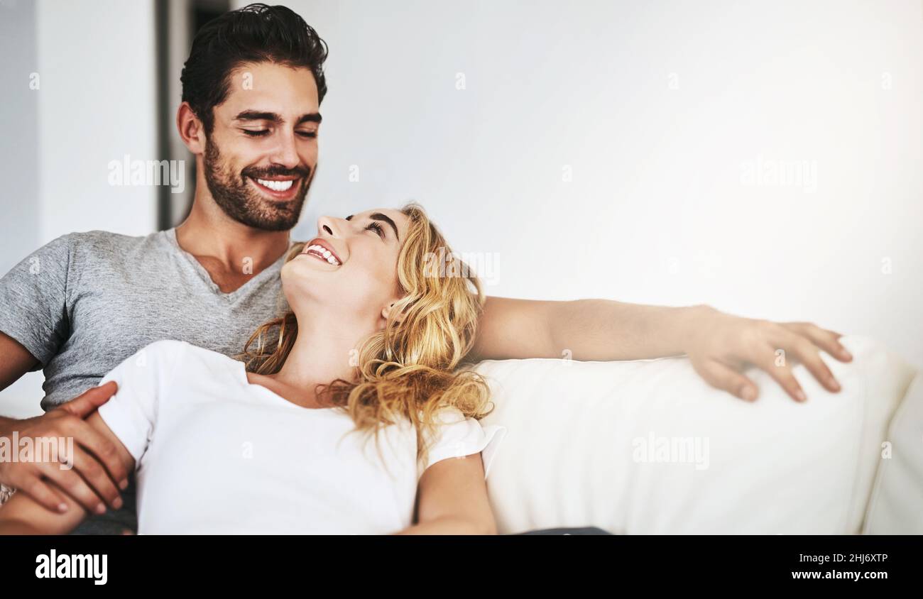 Young woman sitting on chest hi-res stock photography and images - Alamy