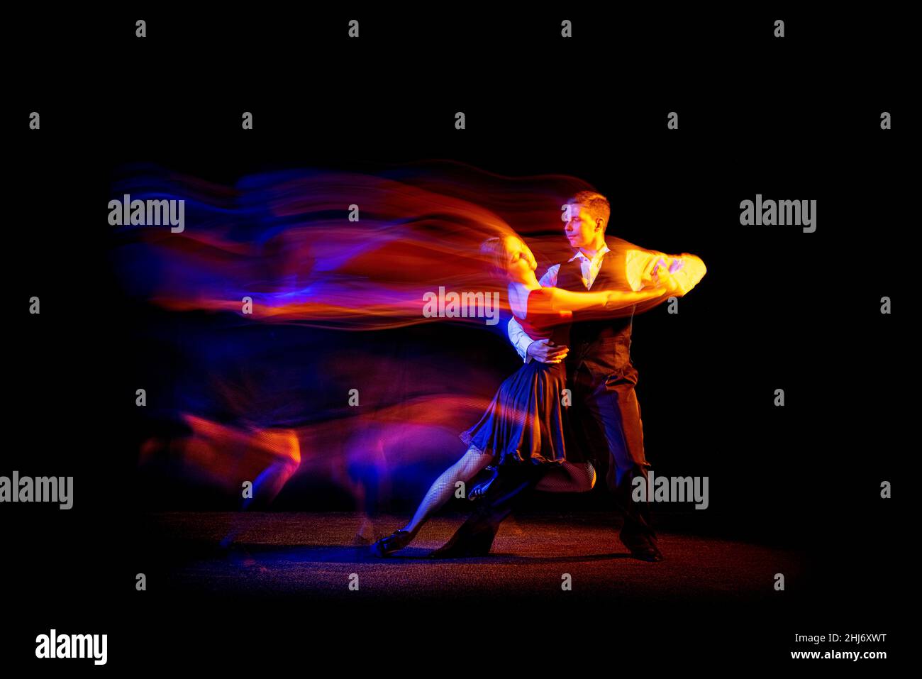 Attractive male and female dancing tango hi-res stock photography and images - Alamy