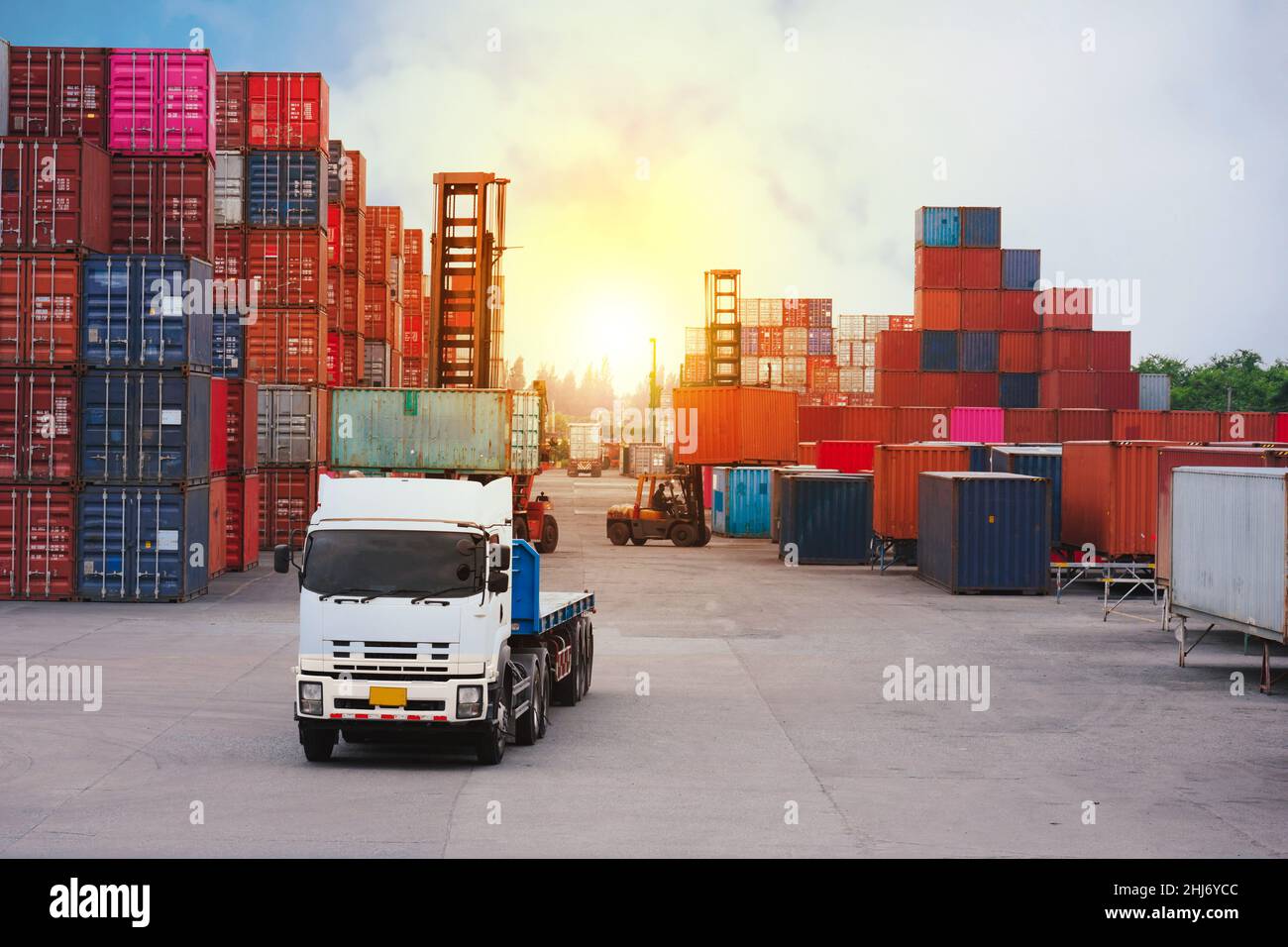 Container forklift in container yard view of transport and industry ...