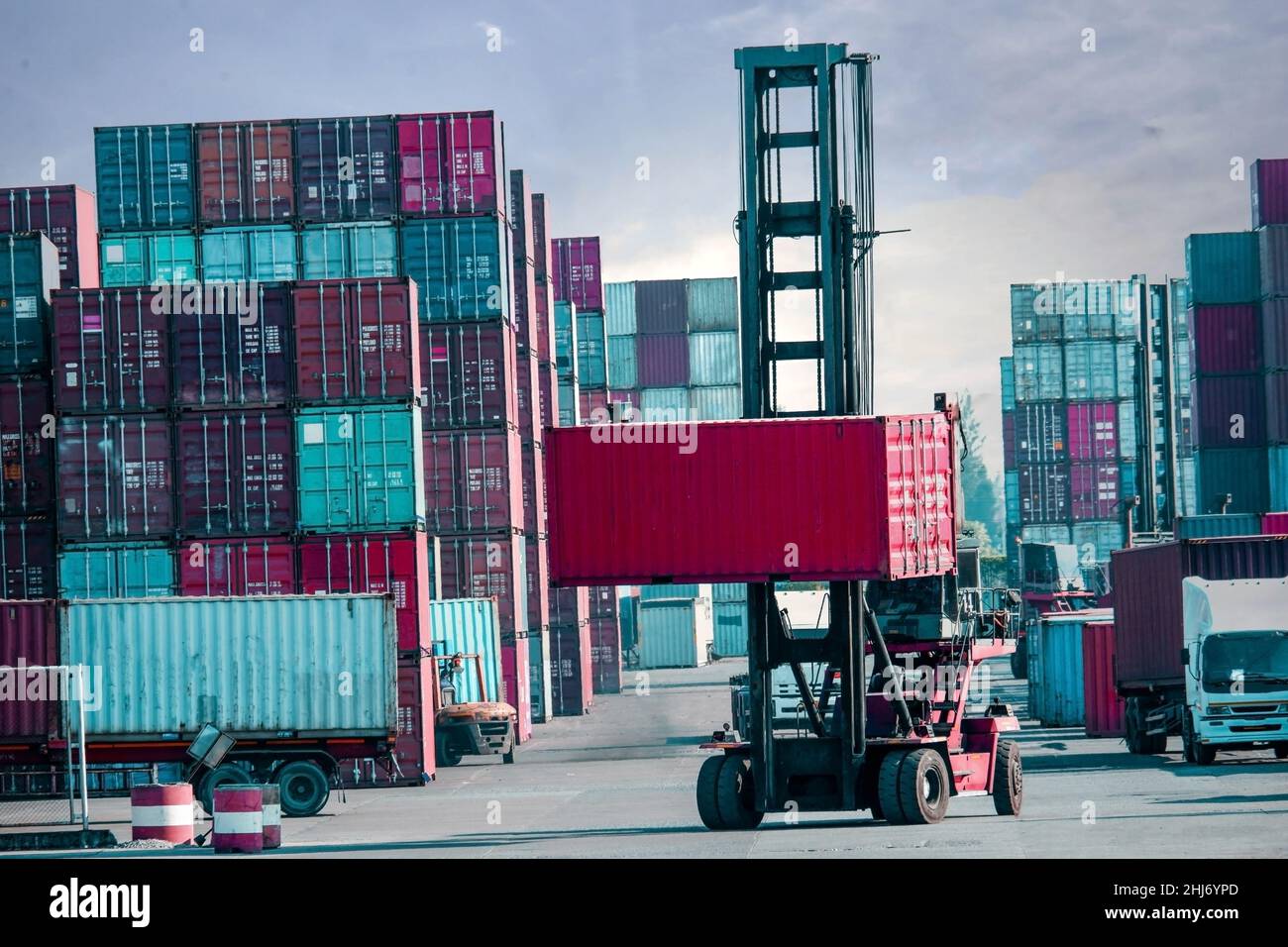 Container stacks and trucks and container forklifts Industry and ...