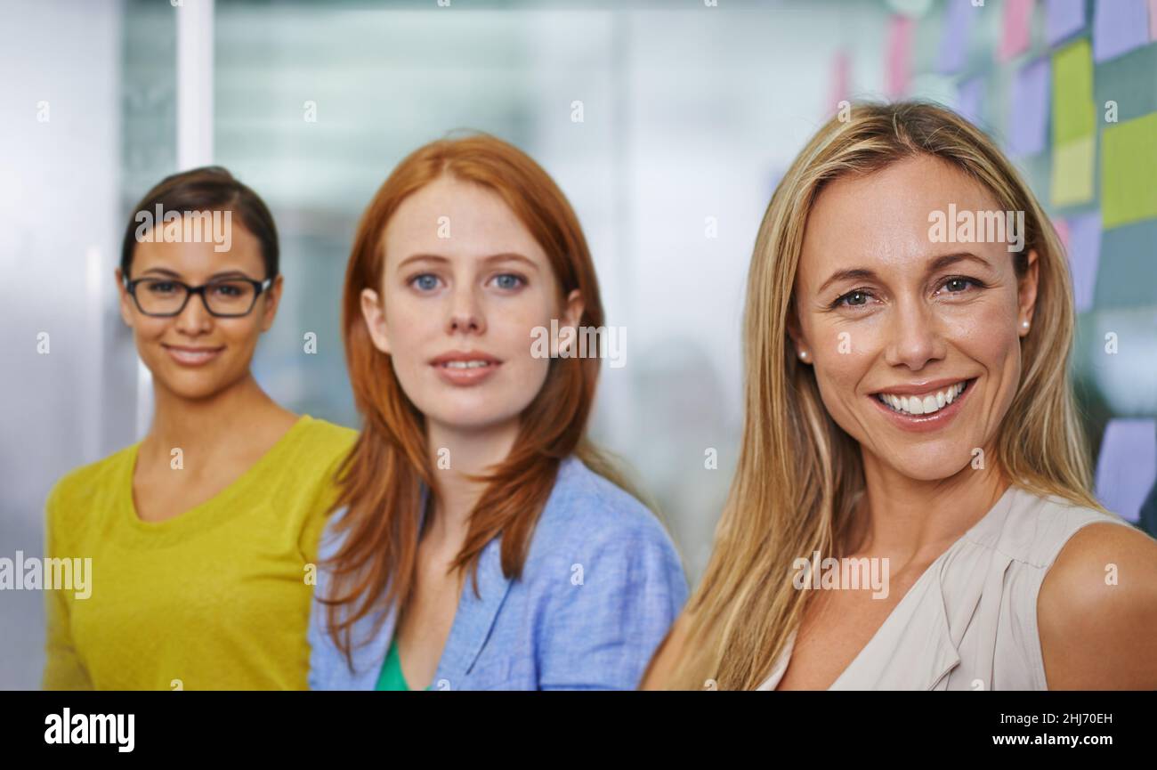 Not just pretty faces. Three attractive female colleagues ready for the ...