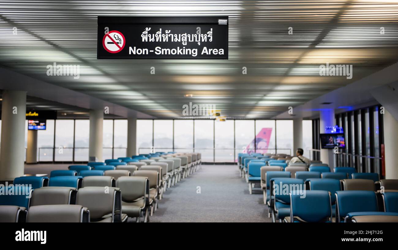 No-smoking sign in airport terminal Stock Photo - Alamy