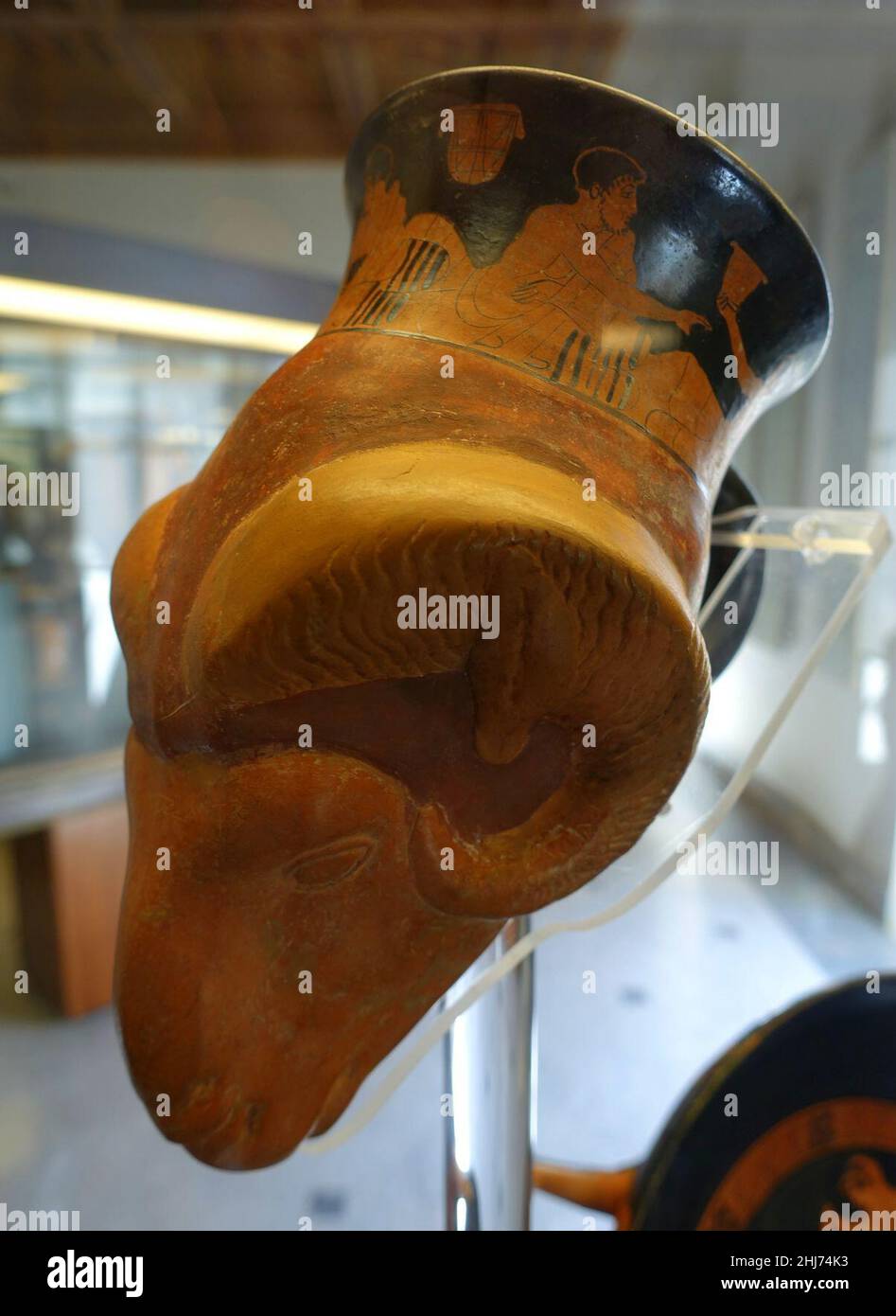 Symposium scene, Attic red-figure rhyton in the shape of a ram's head ...
