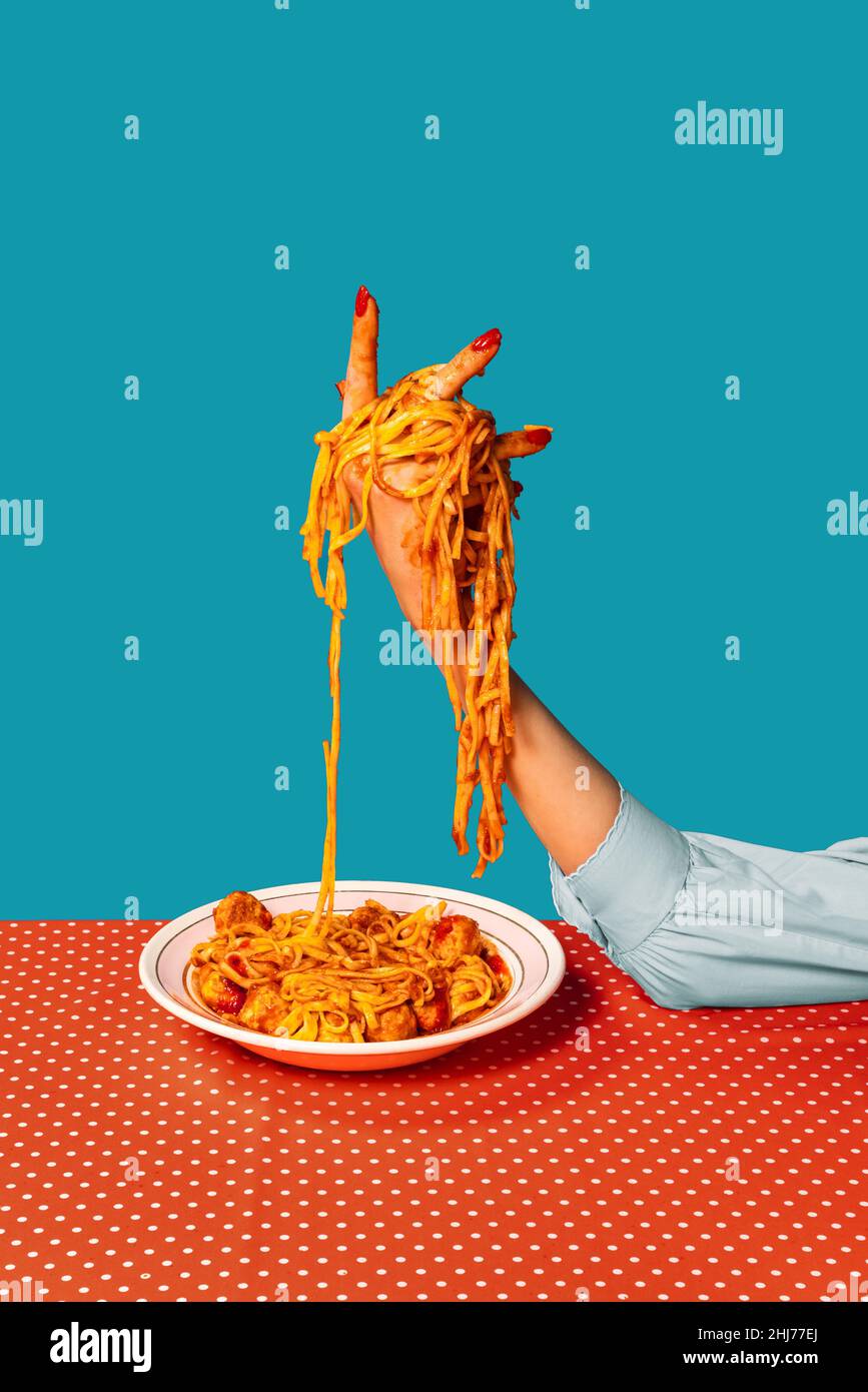 Food pop art photography. Female hands tasting spaghetti with meatballs ...