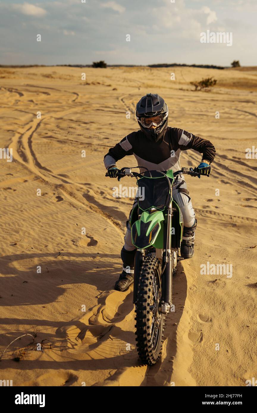 Professional speed rider driving in motocross race Stock Photo - Alamy