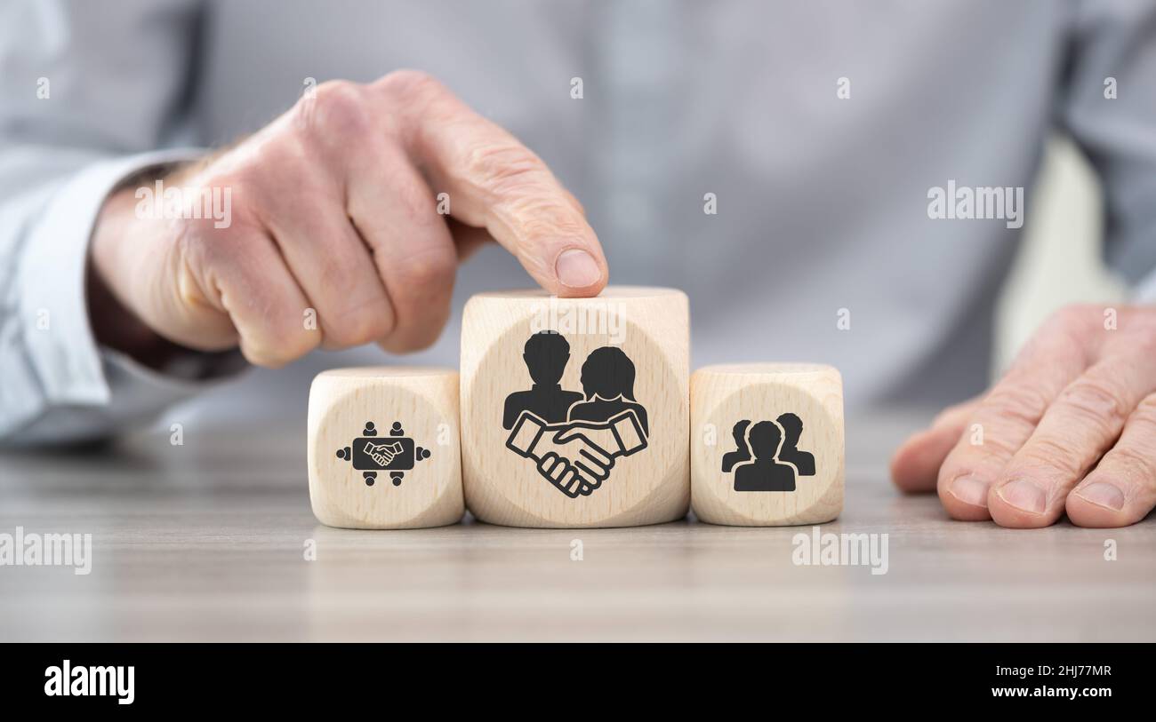 Wooden blocks with symbol of collaboration concept Stock Photo - Alamy