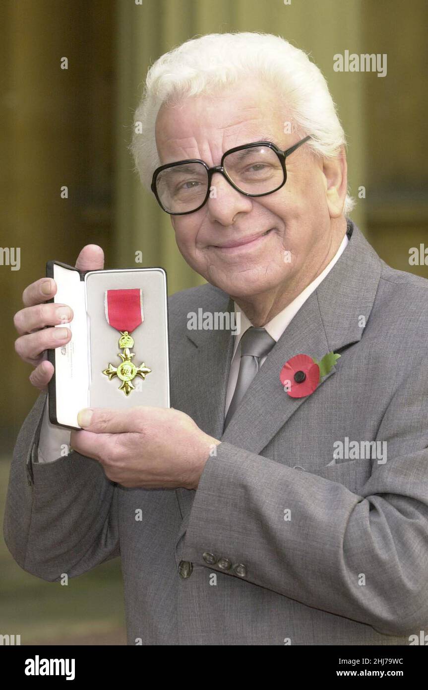File photo dated 13/11/01 of Barry Cryer showing off his OBE awarded to ...