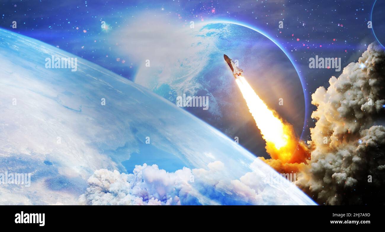 Rockets launch into space on the starry sky. Rocket starts into space ...