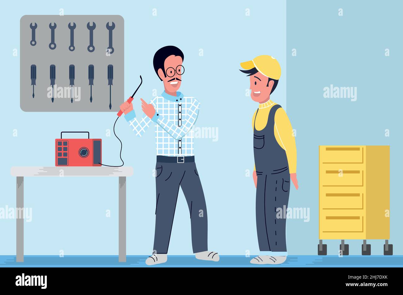 Mechanic chief boss teaching how to use the tools to his employee in ... Mechanic chief boss teaching how to use the tools to his employee in ...
