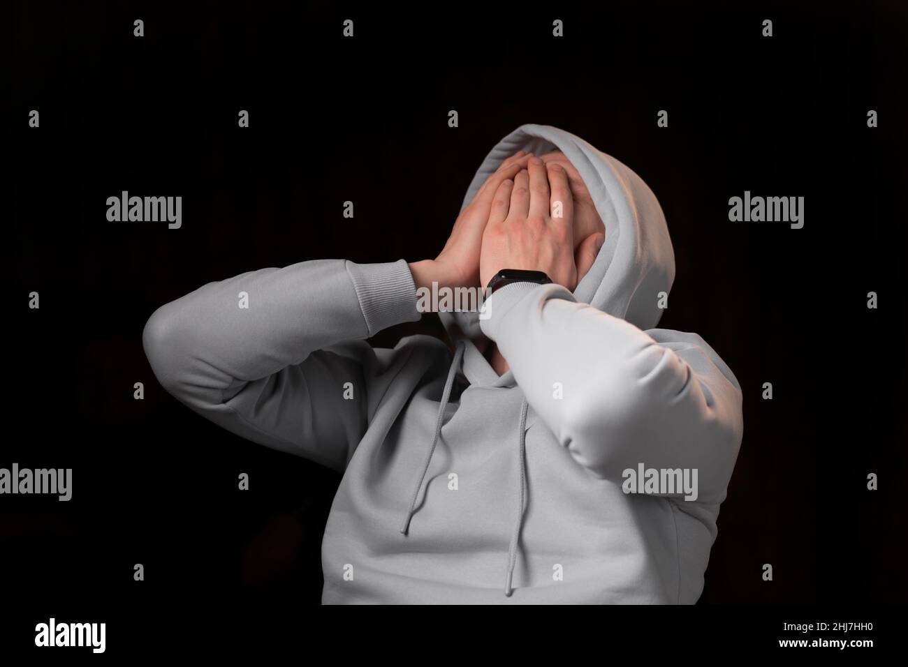 Man hood over head in hi-res stock photography and images - Alamy