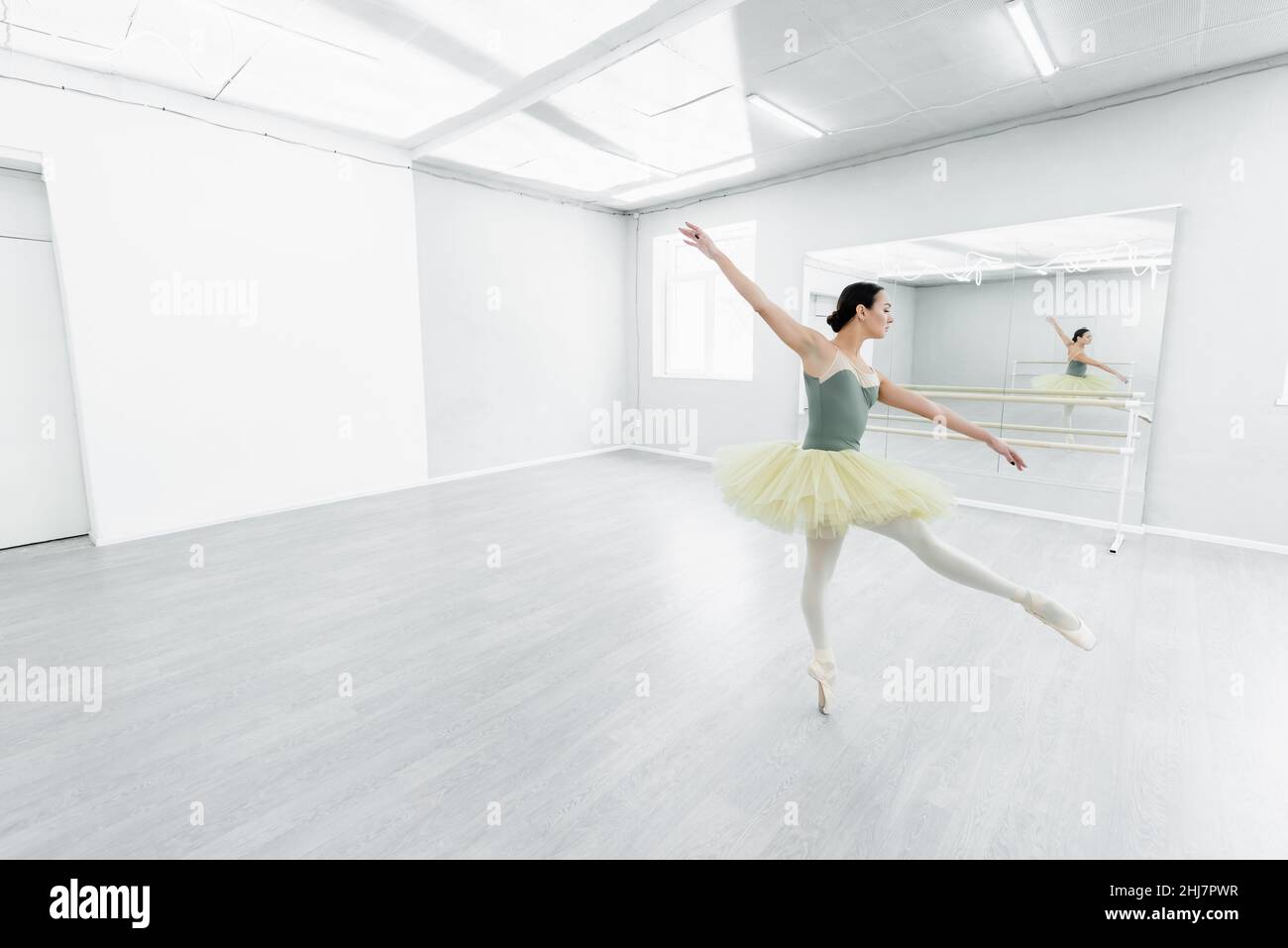 Graceful woman dancing in spacious hi-res stock photography and images ...