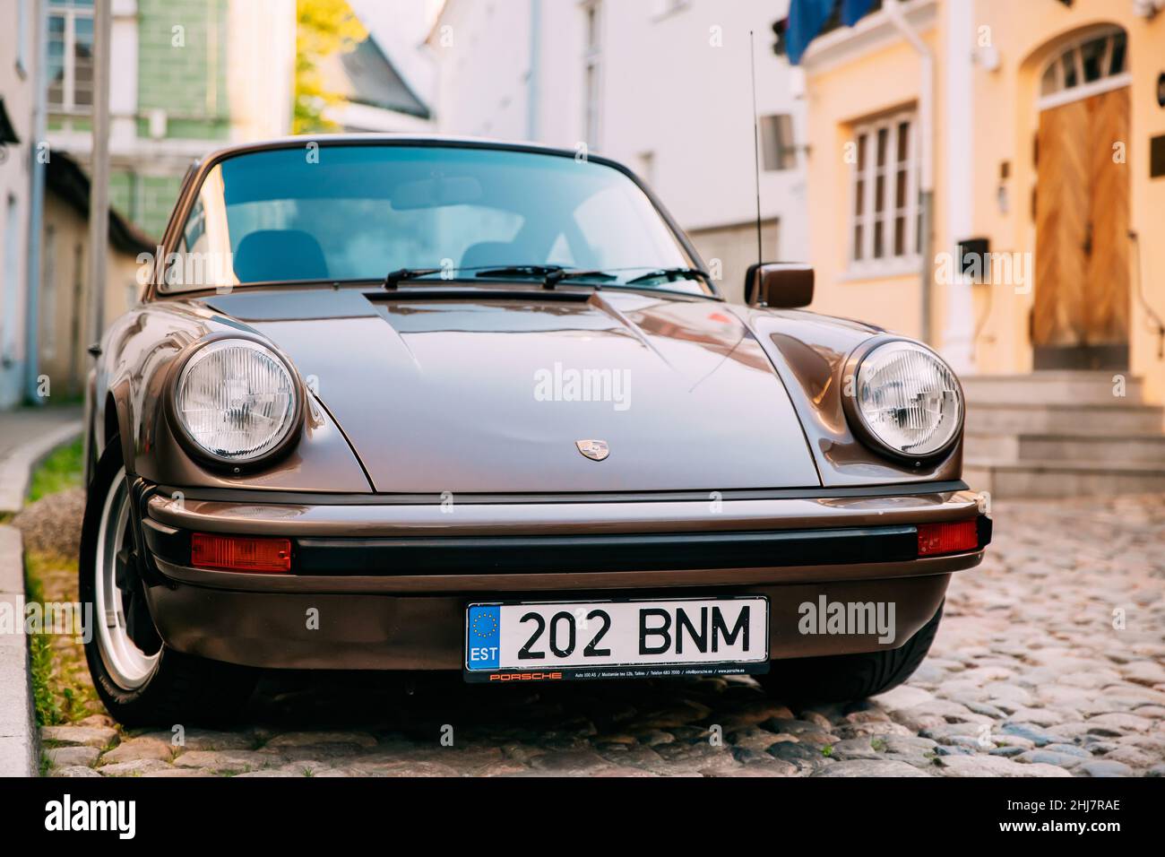 Front View Of Porsche 930 Car Parked In Old Narrow Street Stock Photo ...