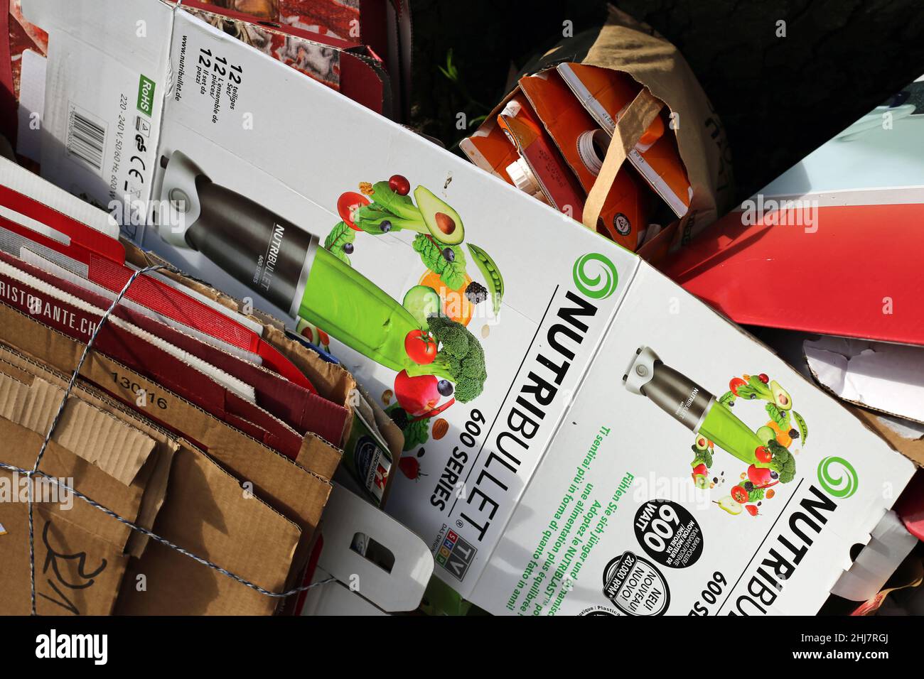 Used cardboard containers on the streets in a neighborhood in Zürich ...