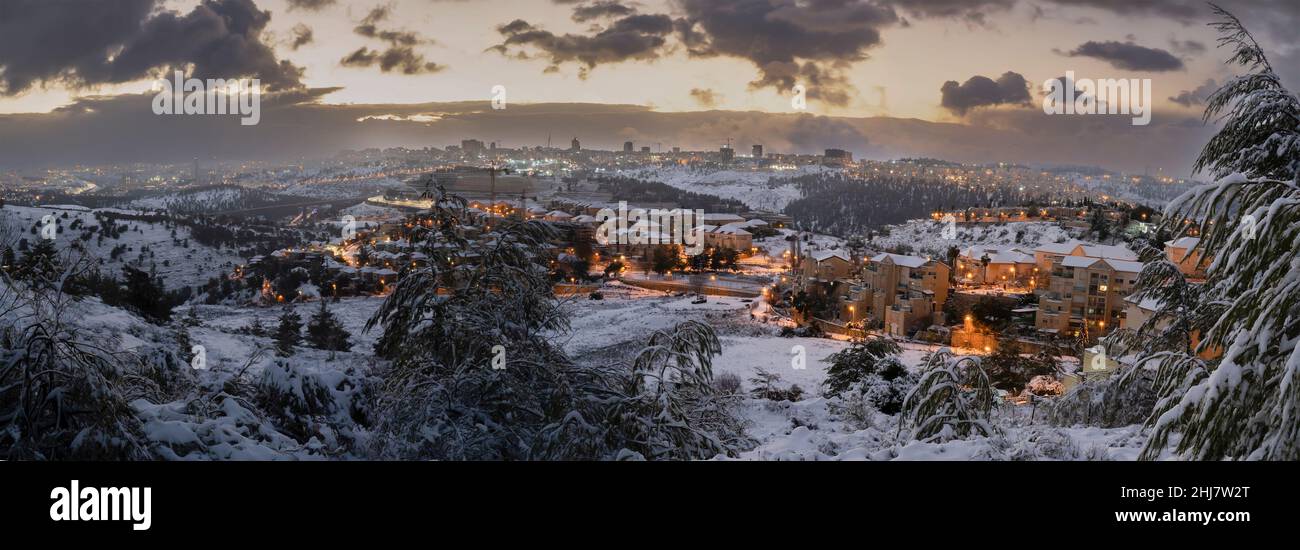 A sunrise over the snow covered Jerusalem, Israel, and the Judea ...