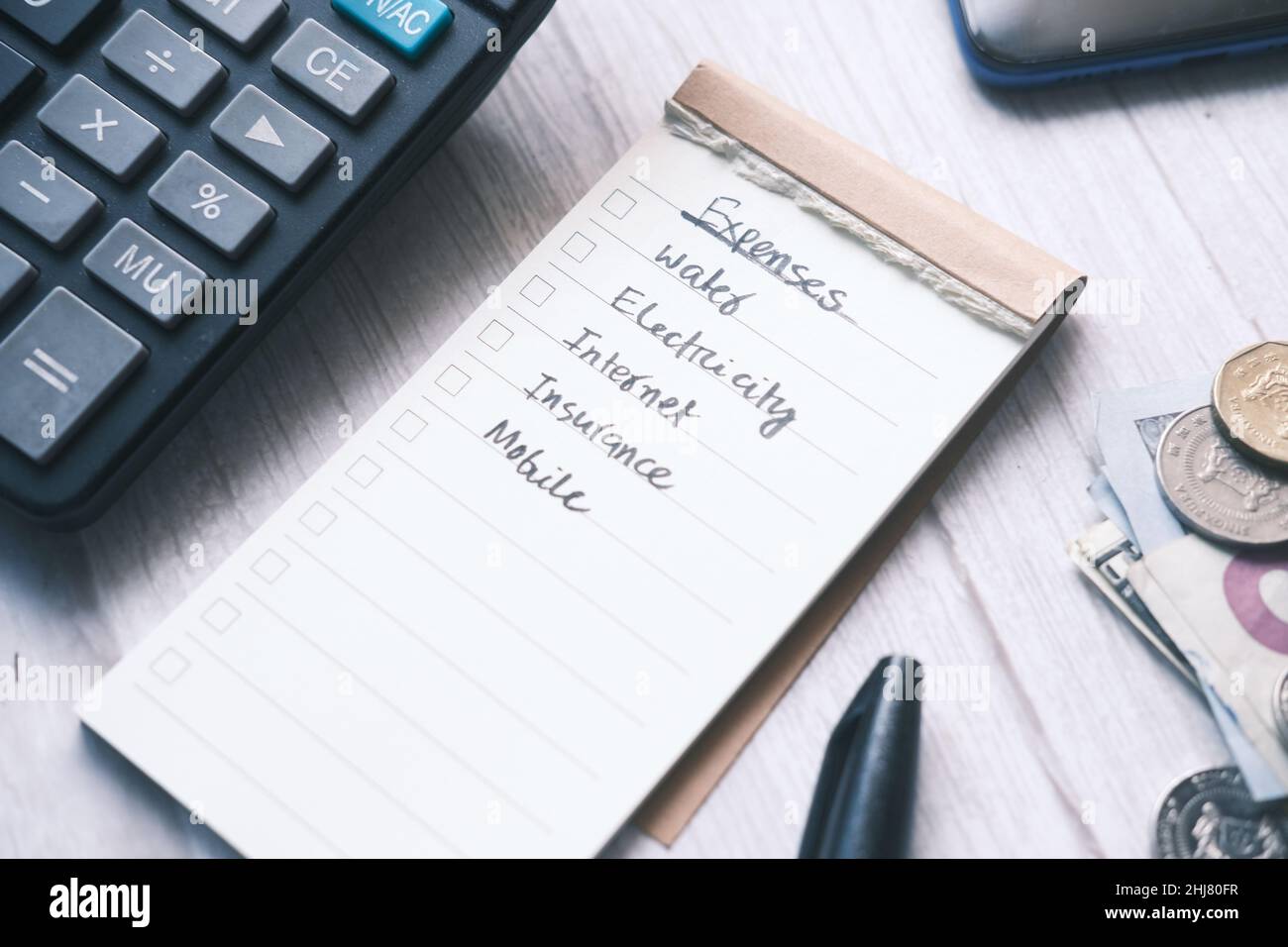 expense check mark on a check box on a paper Stock Photo - Alamy