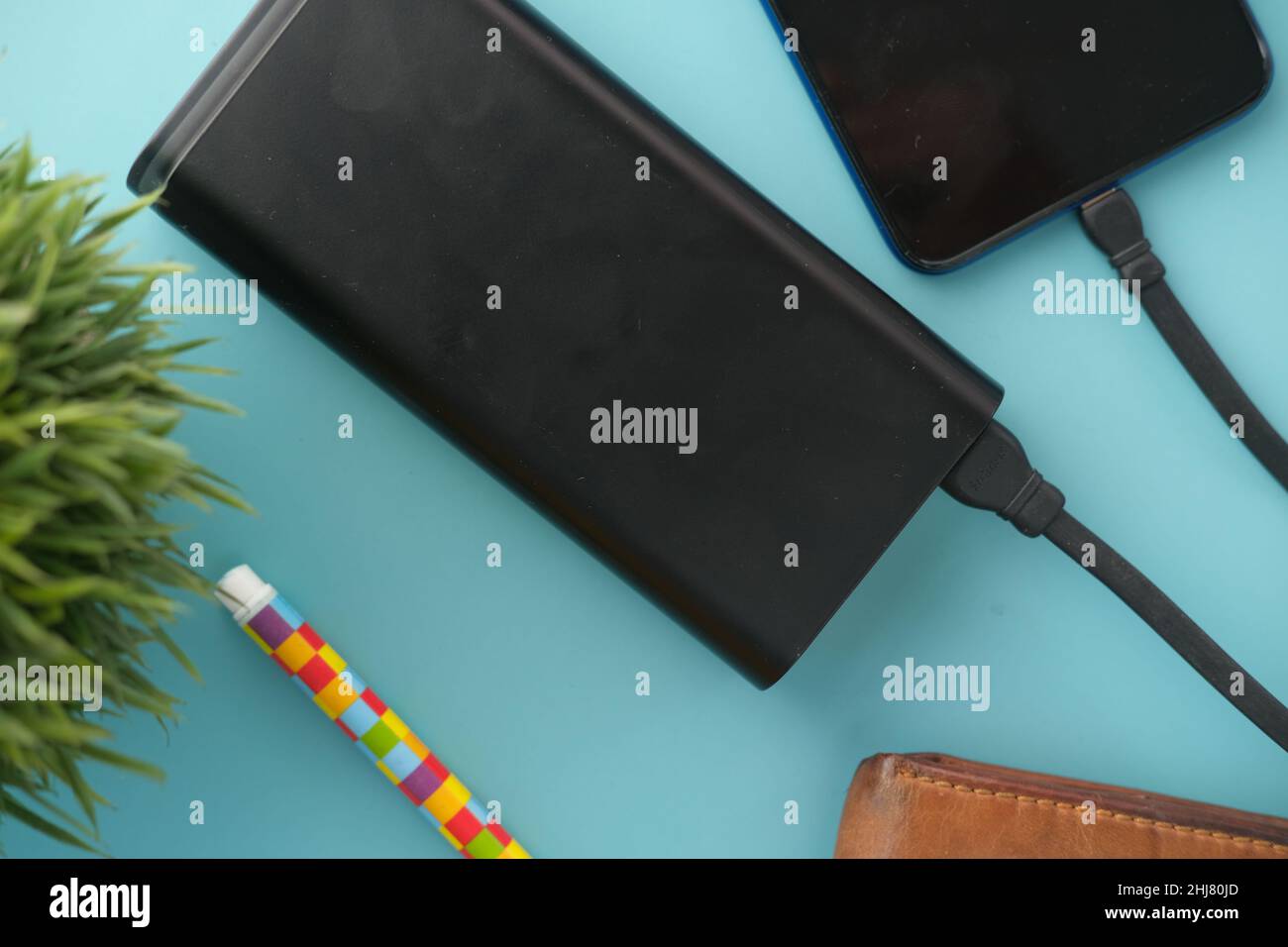 smart phone charging with Power bank top view Stock Photo - Alamy