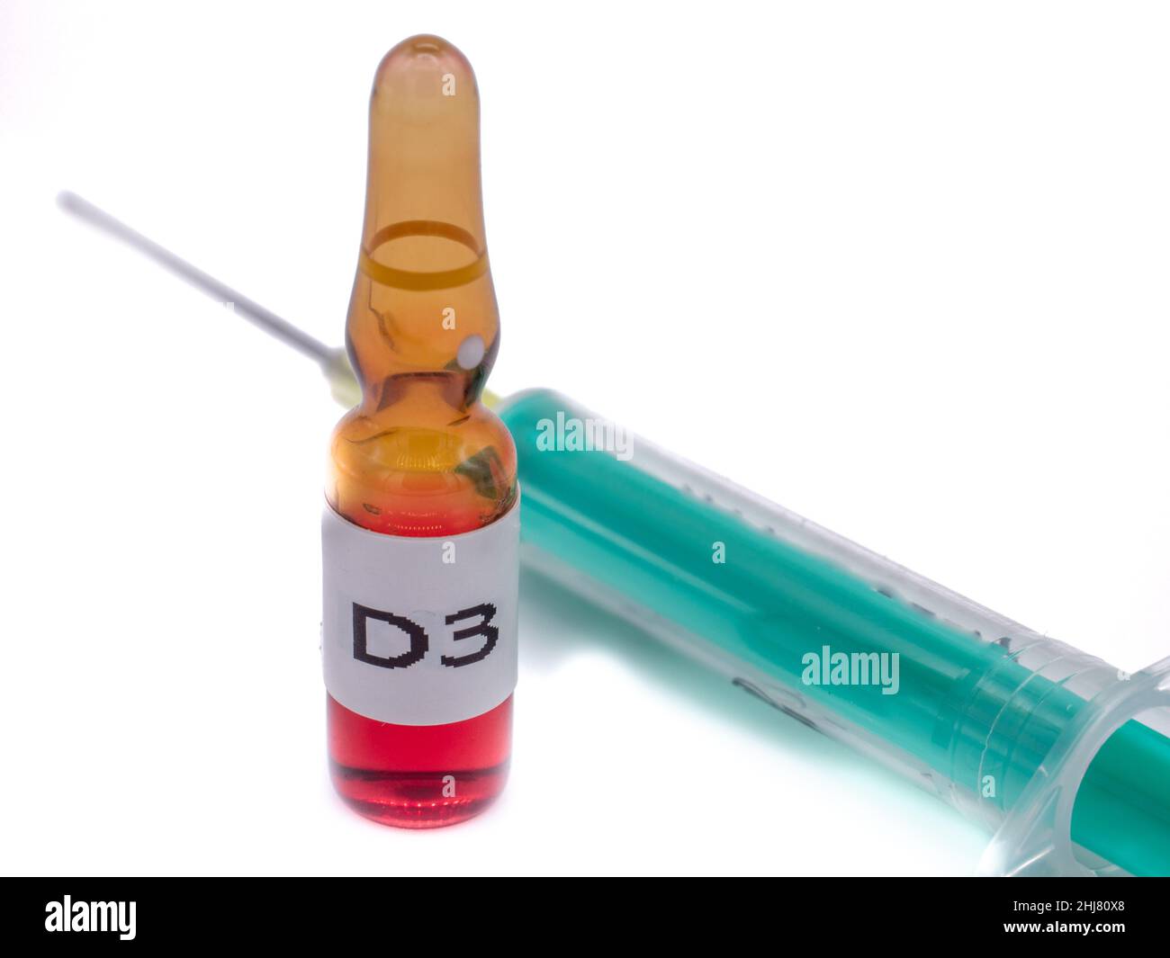 D3 ampoule with syringe isolated on white background Stock Photo - Alamy