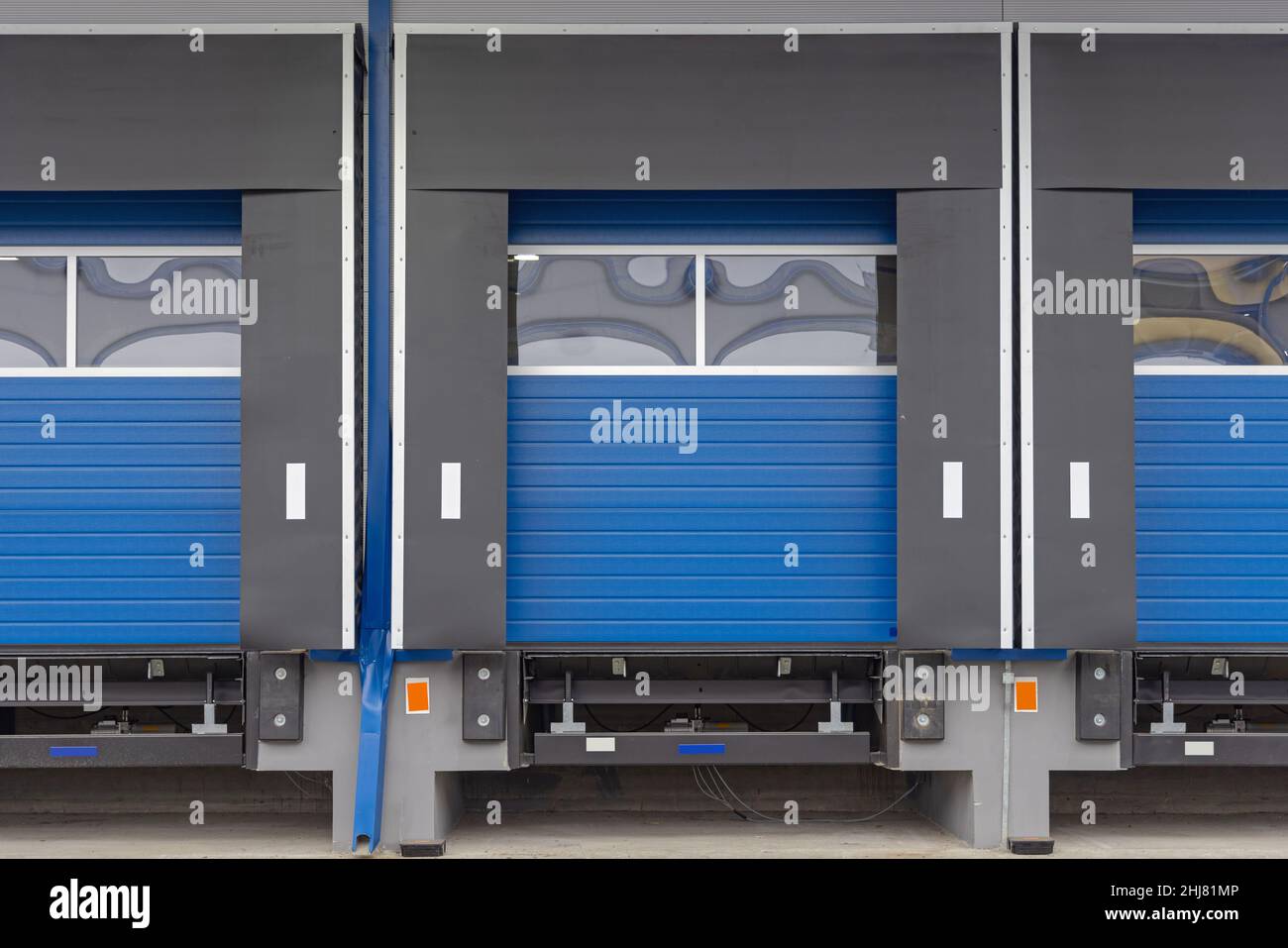 Loading Dock Doors Ramp at Distribution Warehouse Stock Photo - Alamy