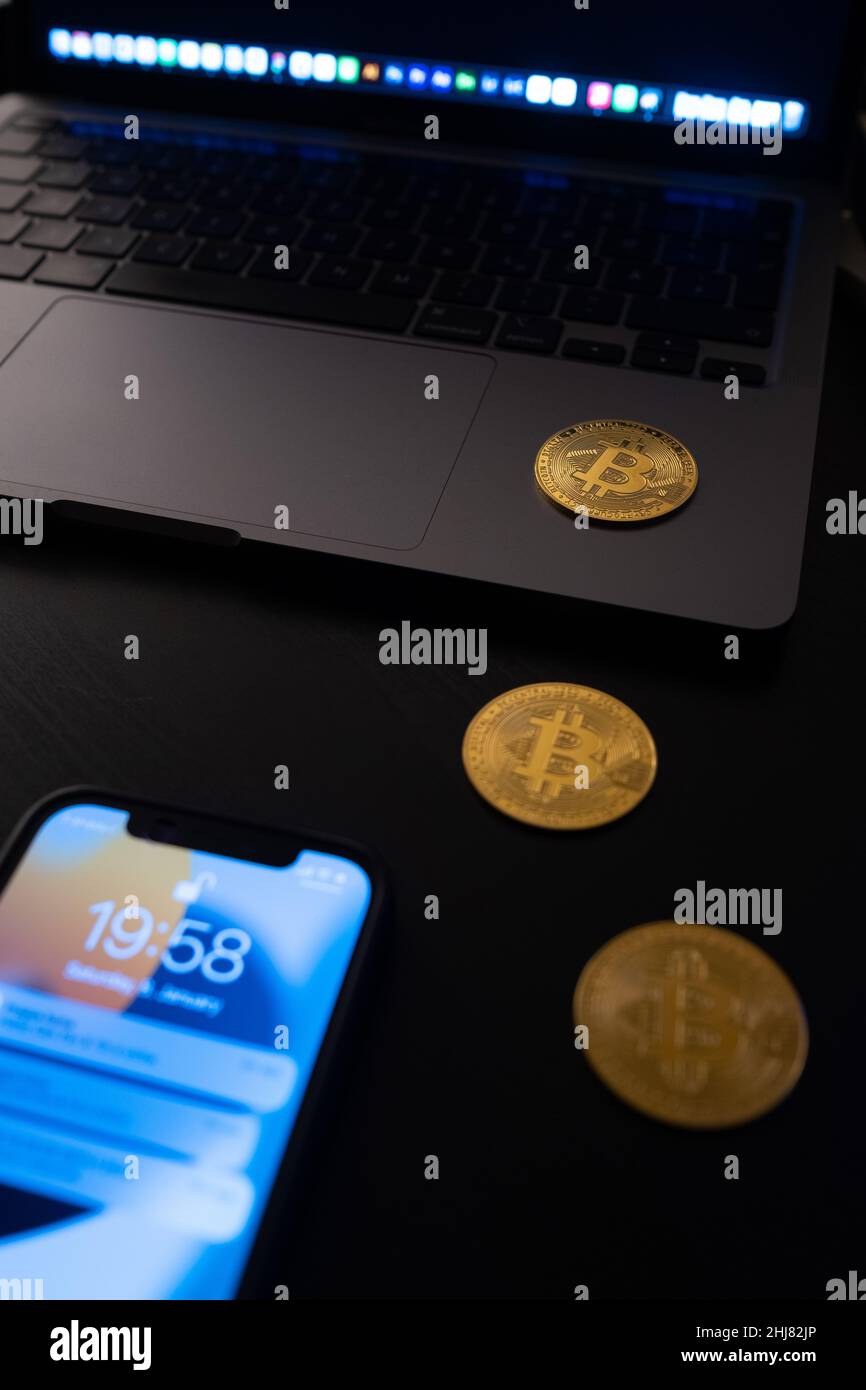 Closeup shot of Bitcoins on the laptop - the concept of cryptocurrency ...