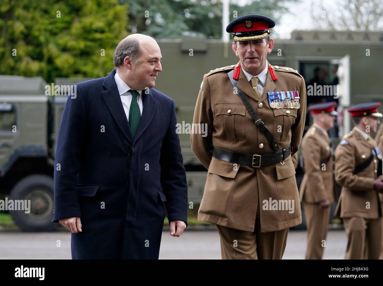 Defence Secretary Ben Wallace (left) after the change of colours parade ...