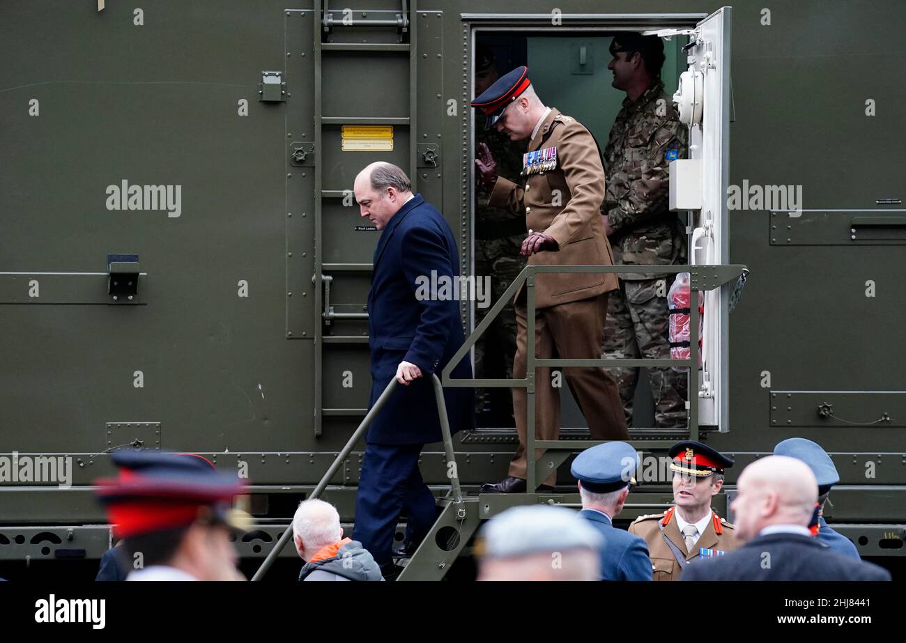 Defence Secretary Ben Wallace (left) after the change of colours parade ...
