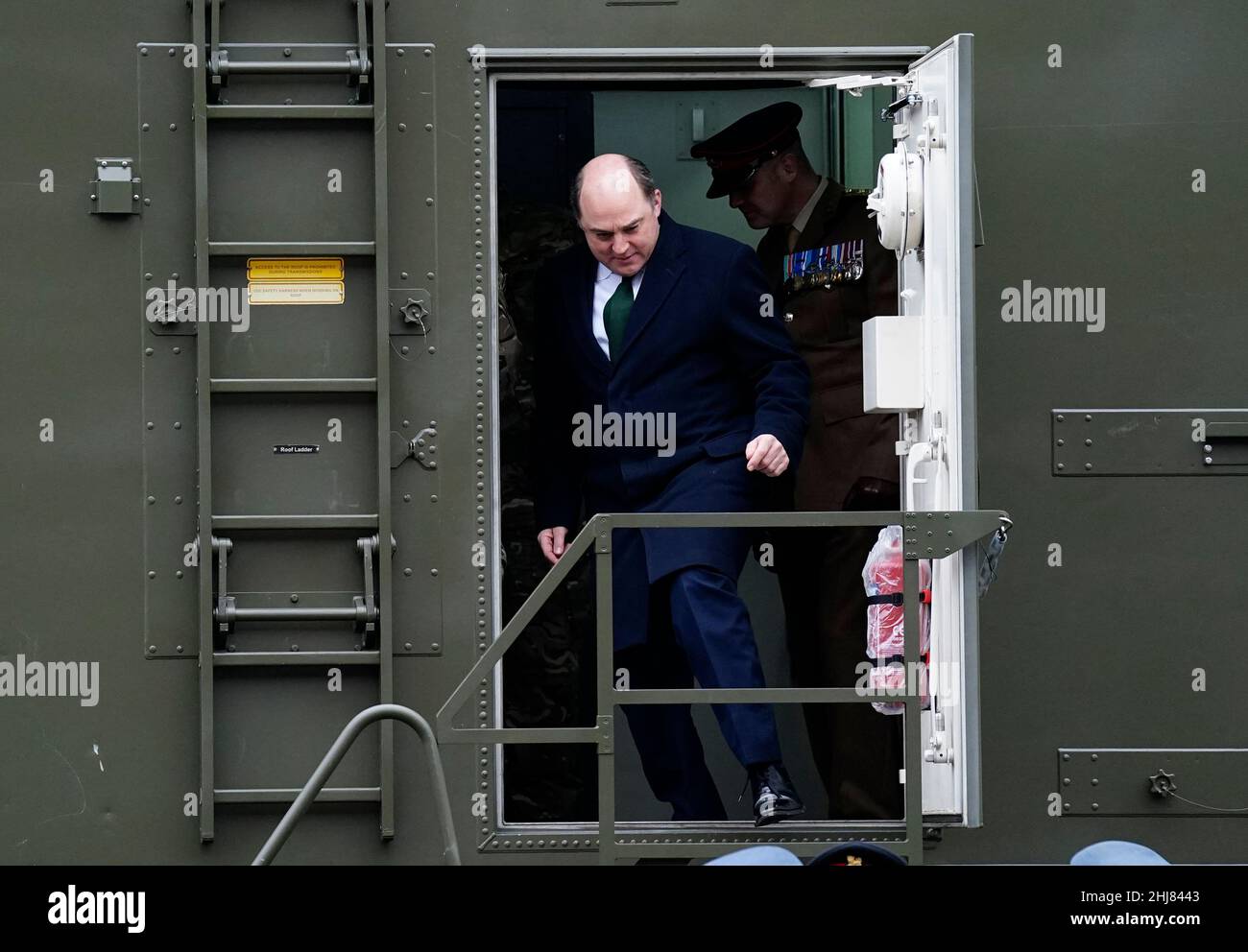 Defence Secretary Ben Wallace (left) after the change of colours parade ...