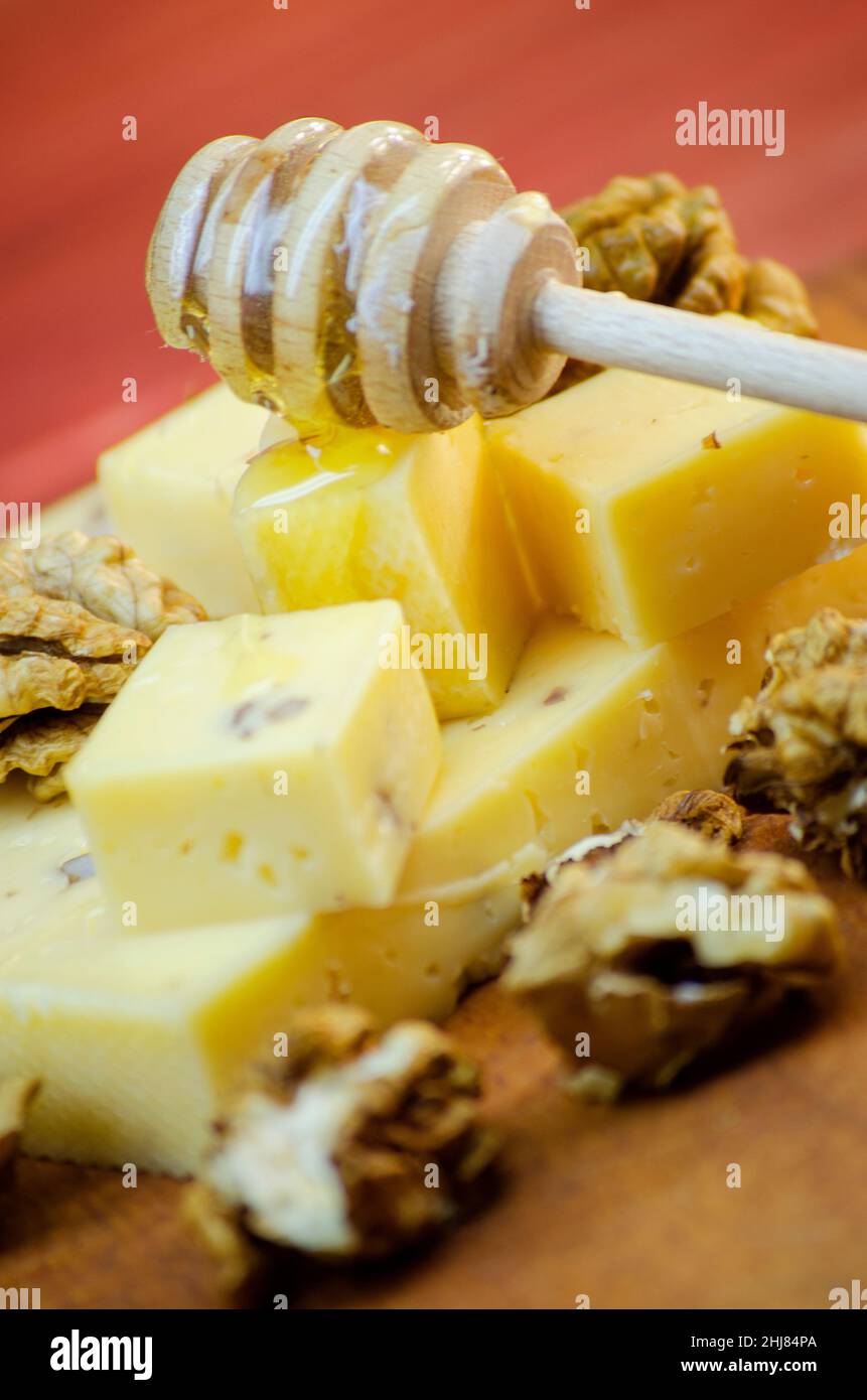 cheese with walnuts and honey - healthy wholesome food Stock Photo - Alamy