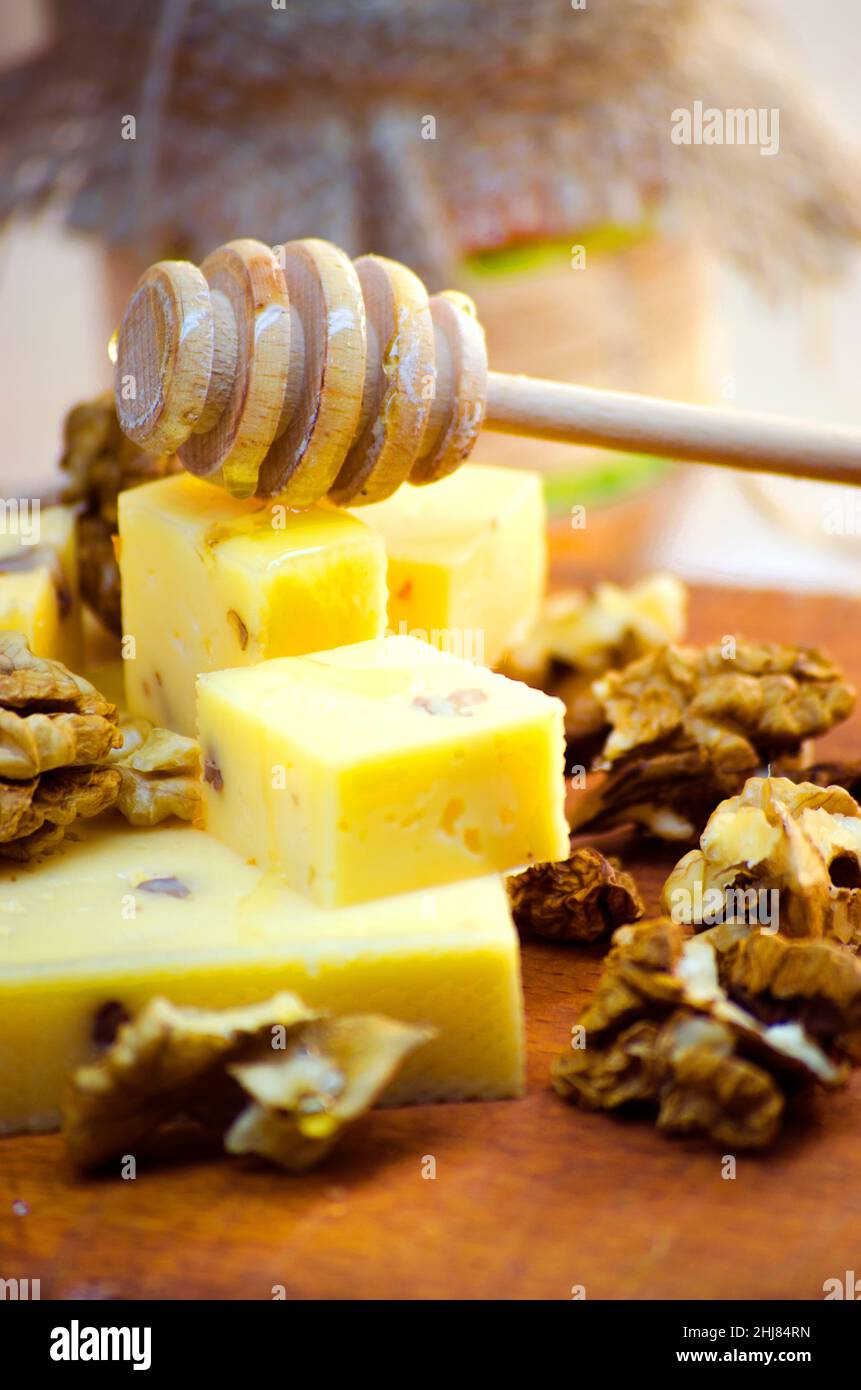 cheese with walnuts and honey - healthy wholesome food Stock Photo - Alamy