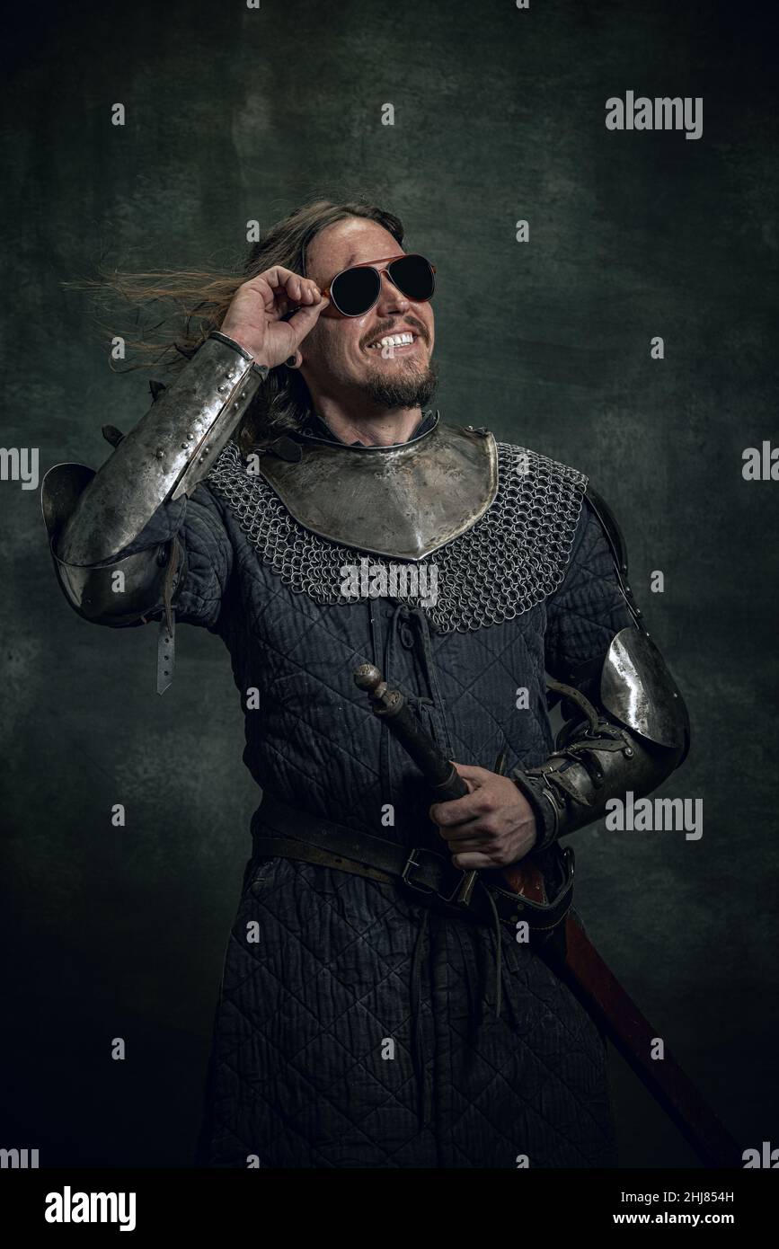 Vintage style portrait of brutal smiling man, medieval warrior or ...