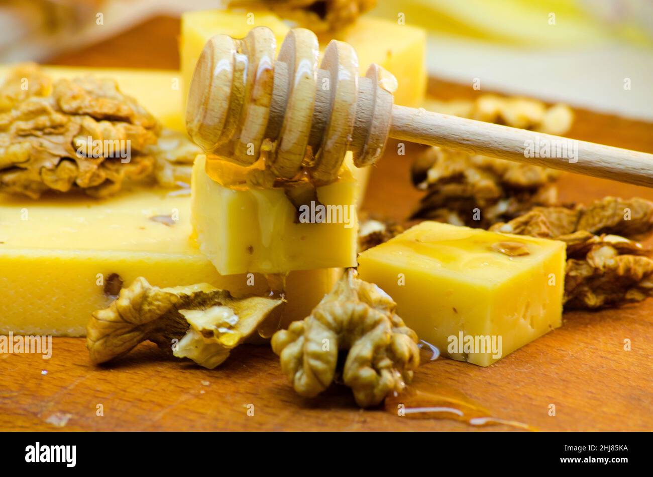 cheese with walnuts and honey - healthy wholesome food Stock Photo - Alamy