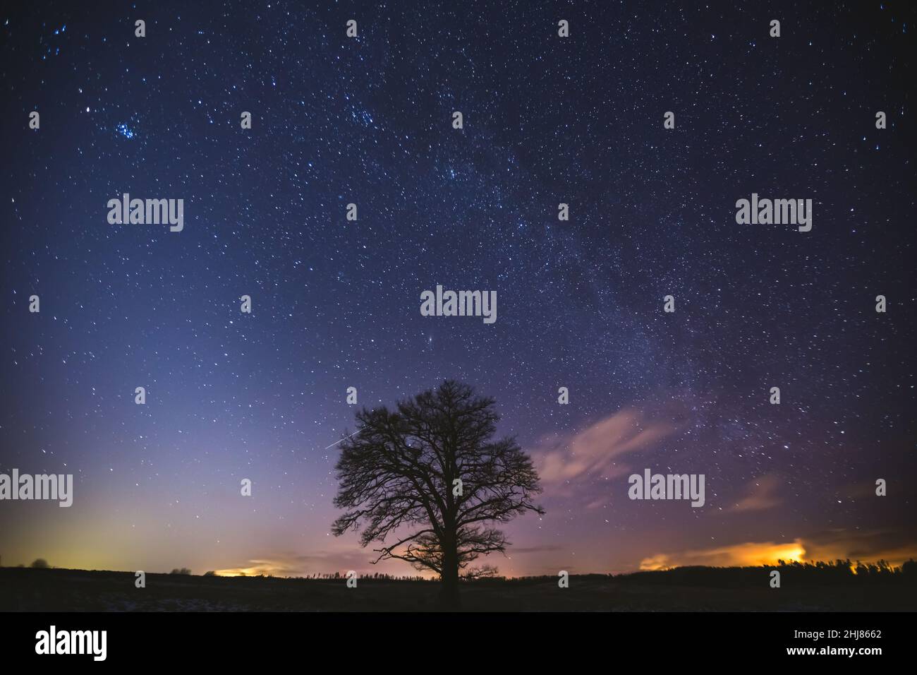 Night landscape image with colorful milky way and zodiac light in the ...