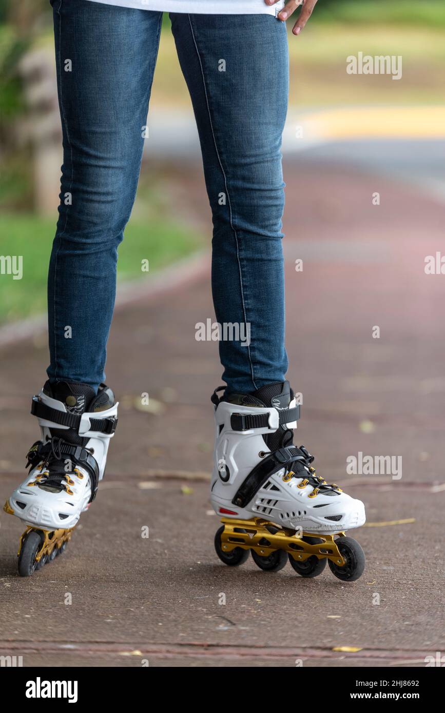 Close-up view of male legs in roller blades Stock Photo - Alamy